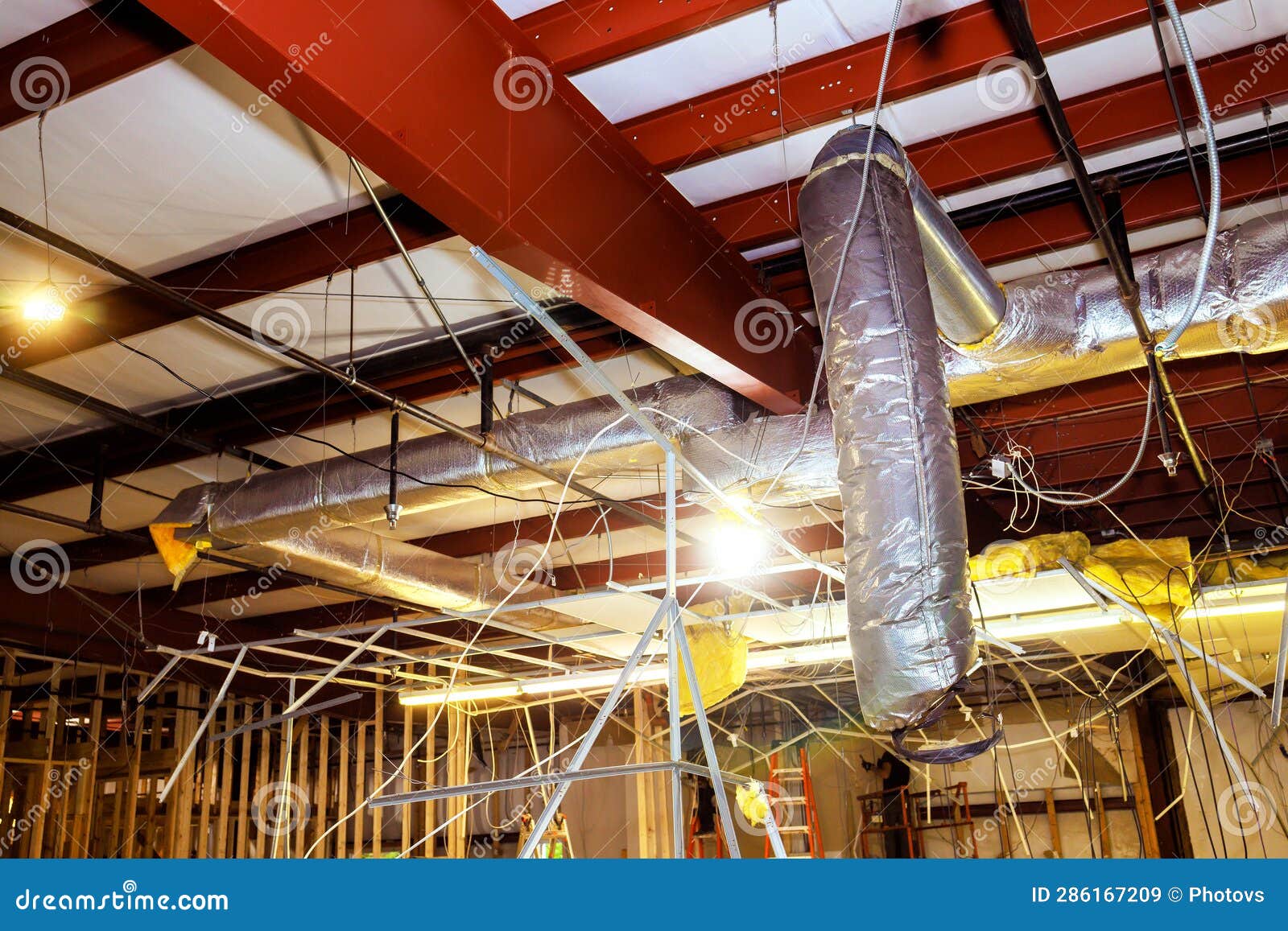Ceiling Works are Carried Out within a Construction Complex during ...