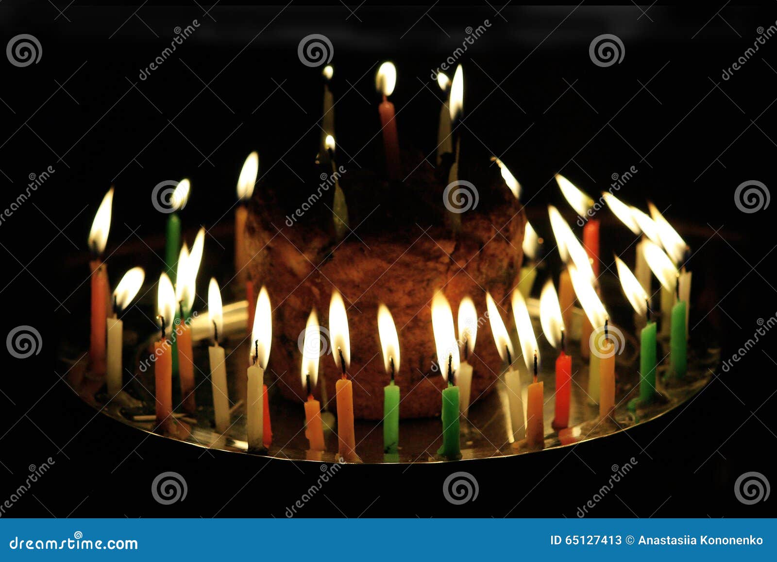 A Celebratory Cake with Burning Candles Stock Image - Image of dark ...
