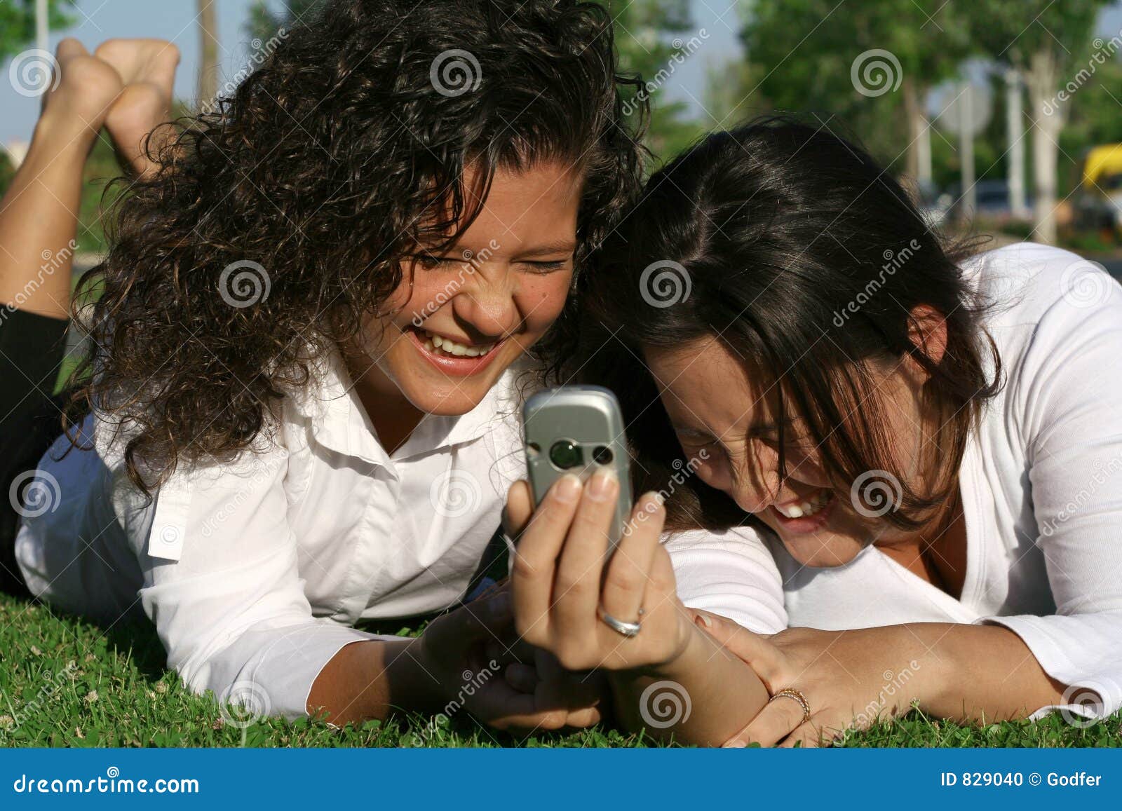 Cell or mobile phone fun stock photo. Image of young, outside - 829040
