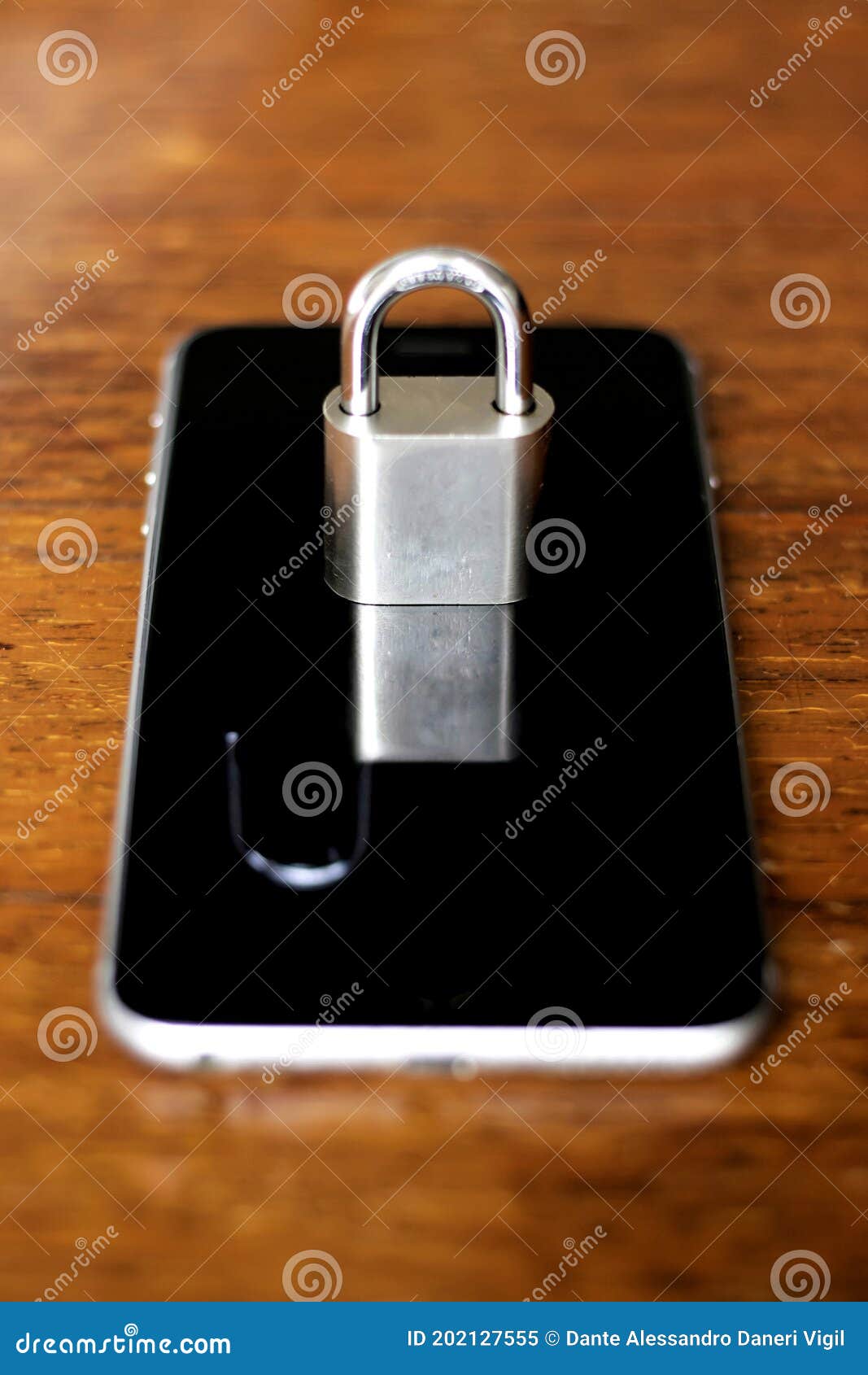 Cell Phone with a Closed Padlock that is Reflected on the Screen Like ...
