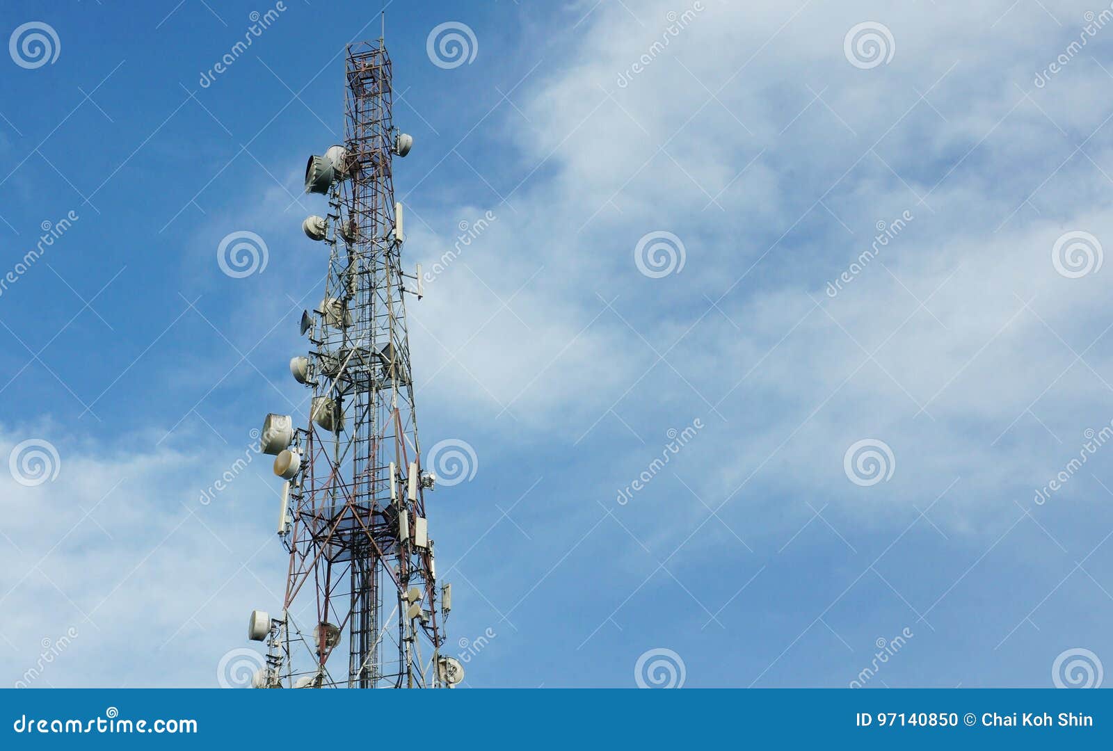 Cell Phone Communications Tower Against Blue Sky Stock Photo - Image of ...