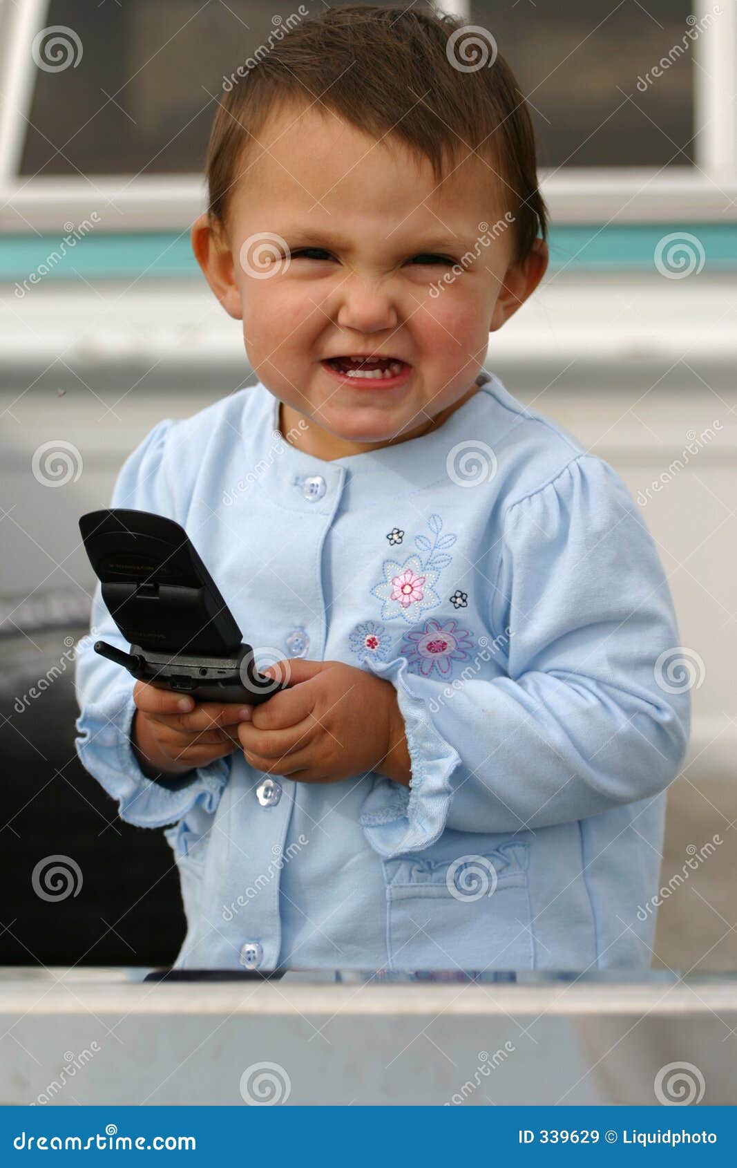Cell Phone Frustration stock image. Image of adorable, cellphone - 339629