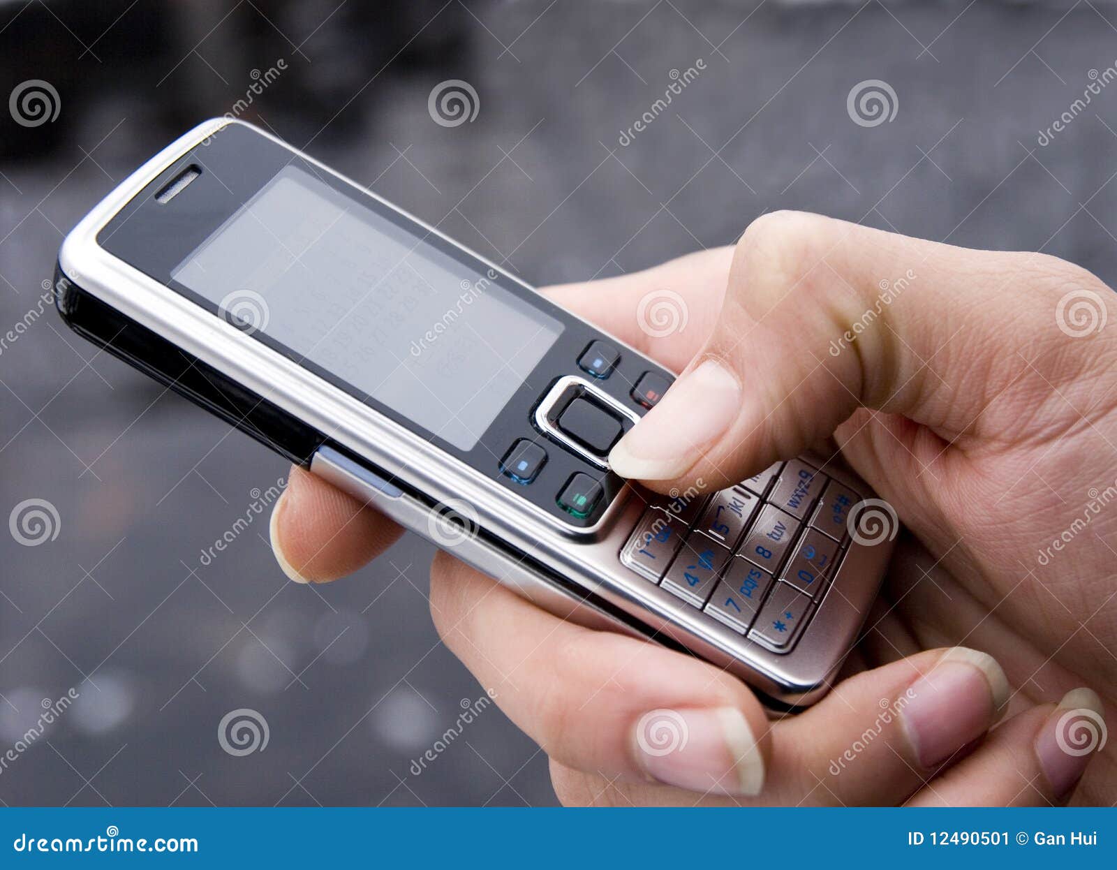 Cell phone in hand stock image. Image of male, interpersonal - 12490501