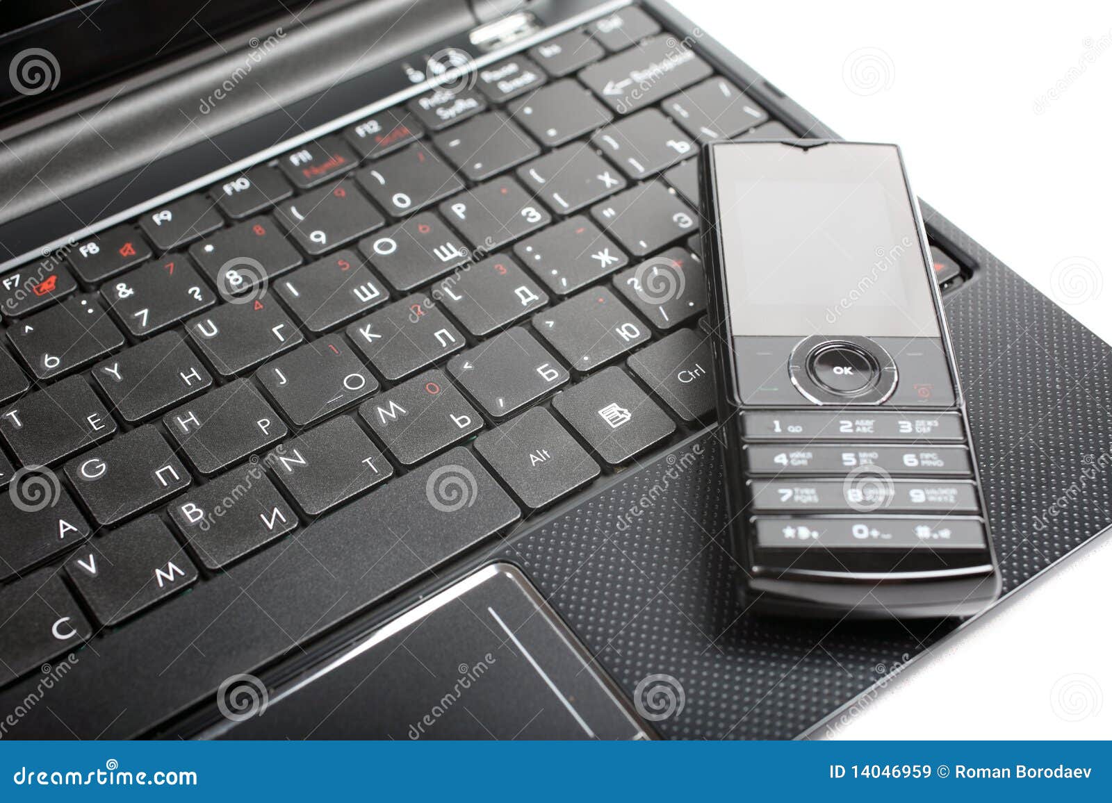 Cell phone and laptop. stock image. Image of company - 14046959