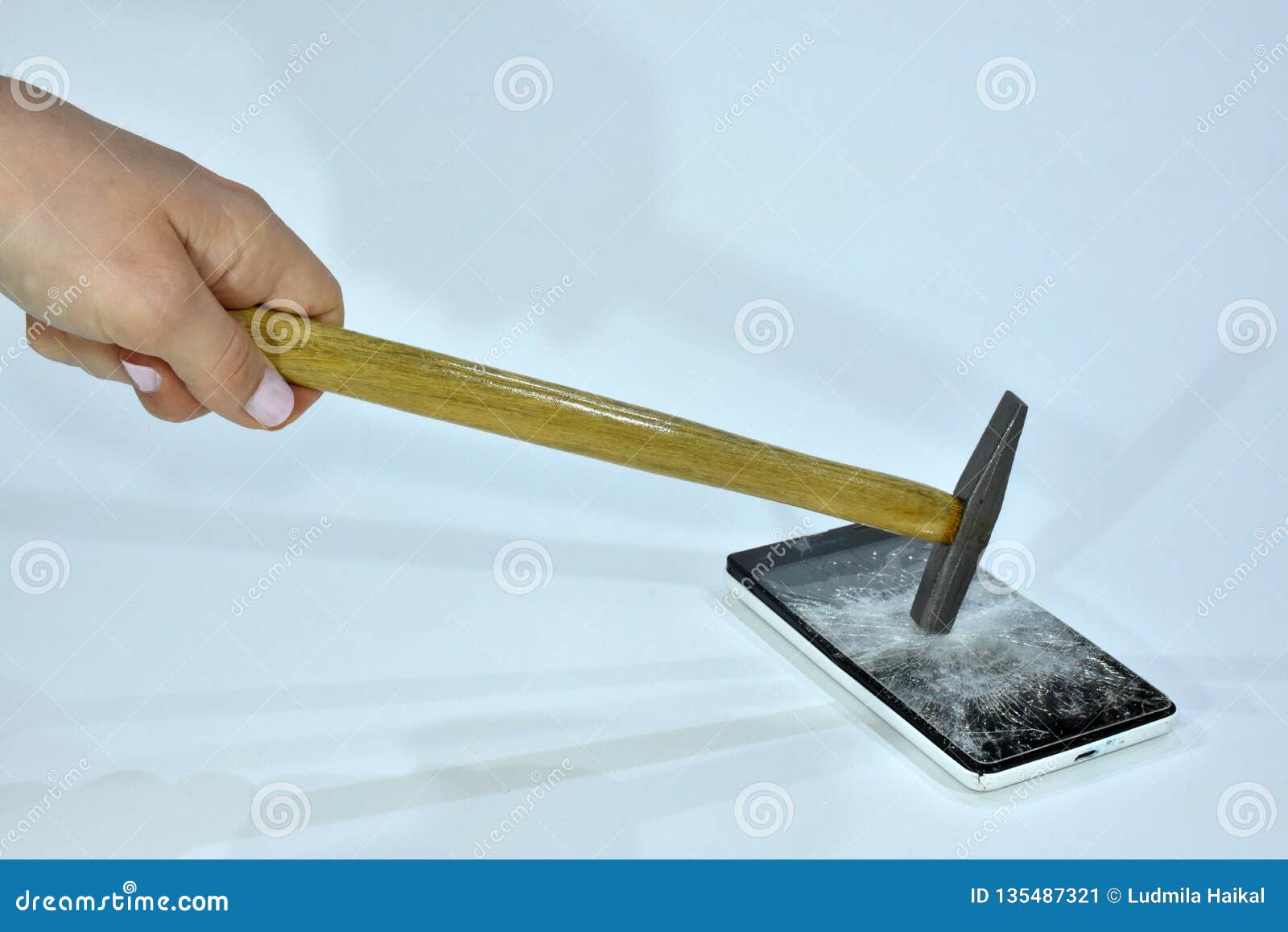 Cell Phone with the Screen Broken by a Hammer Stock Image - Image of ...