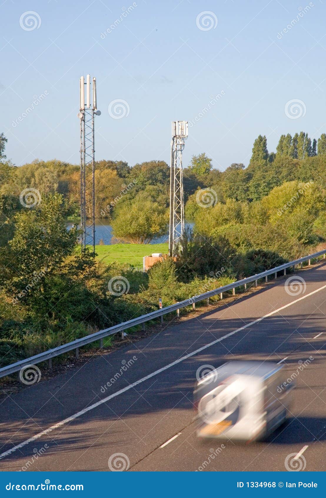 Cell Phone Towers by a Motorway Stock Photo - Image of ...