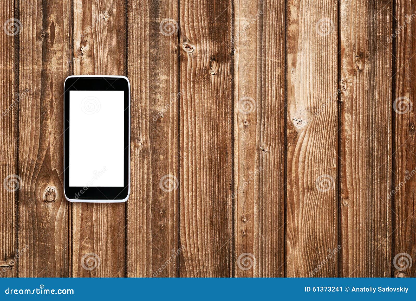 Cell phone on wooden table stock image. Image of wood - 61373241