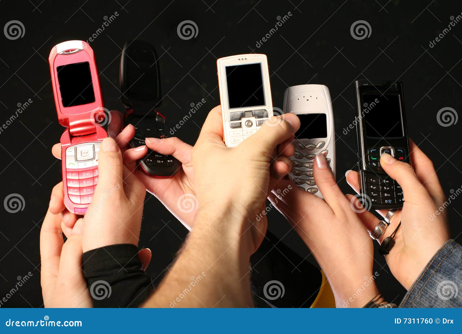 Cell phones in hands stock photo. Image of fingers, message - 7311760