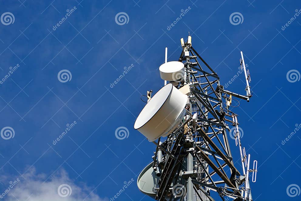 Cell Tower with Microwave Dishes at a Low Angle Stock Image - Image of ...
