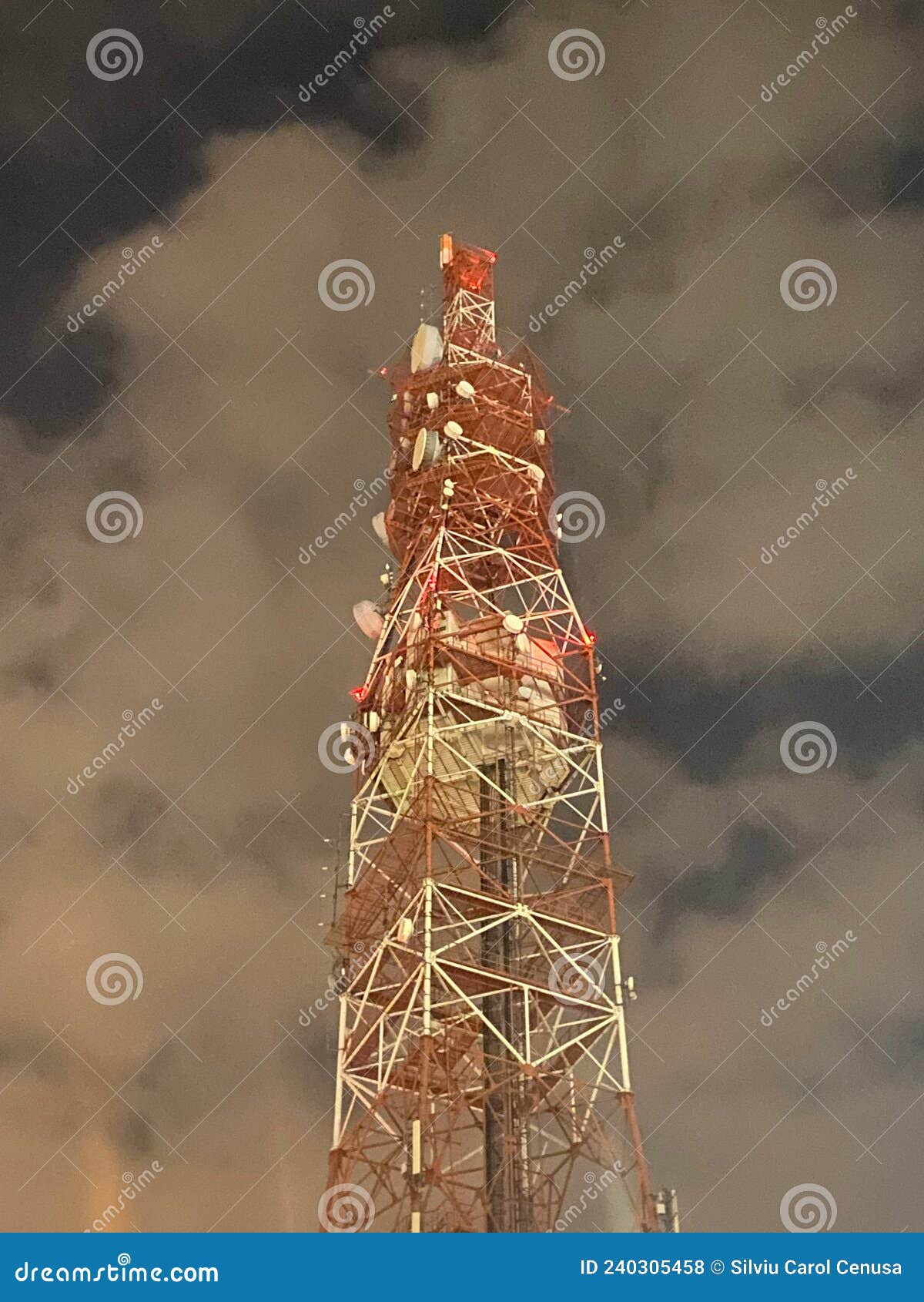 Cell Tower on Night Closeup View with White Clouds on Sky Stock Photo ...