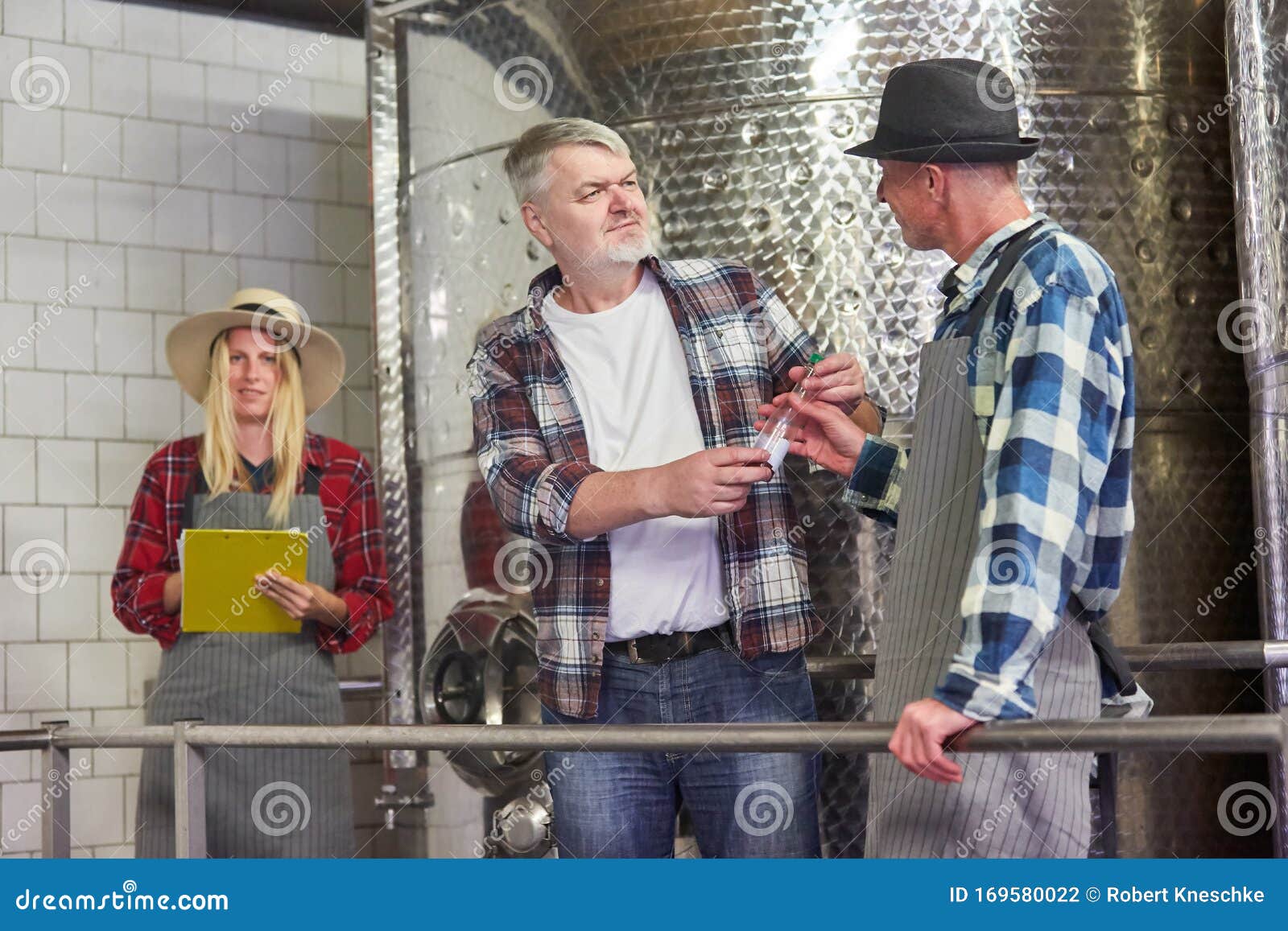 Cellar Master and Winemaker in Front of the Fermentation Tank Stock ...
