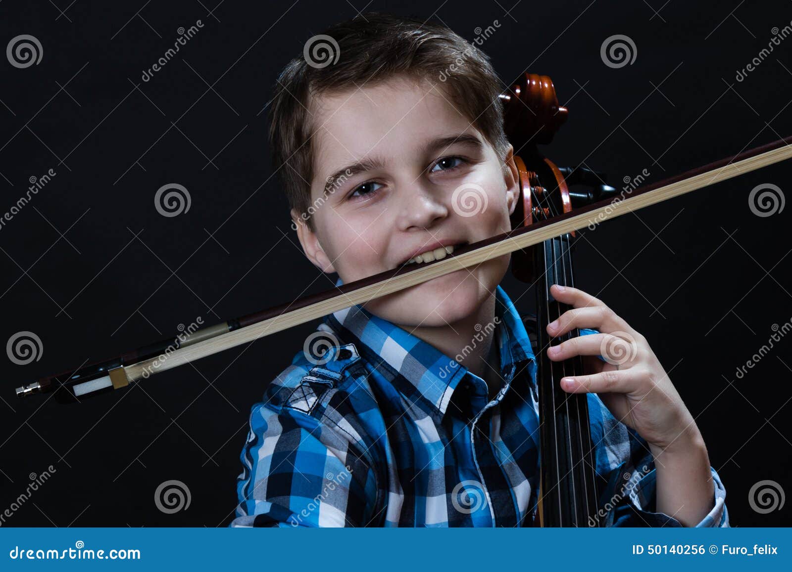 Cellist with fiddlestick stock photo. Image of musical - 50140256
