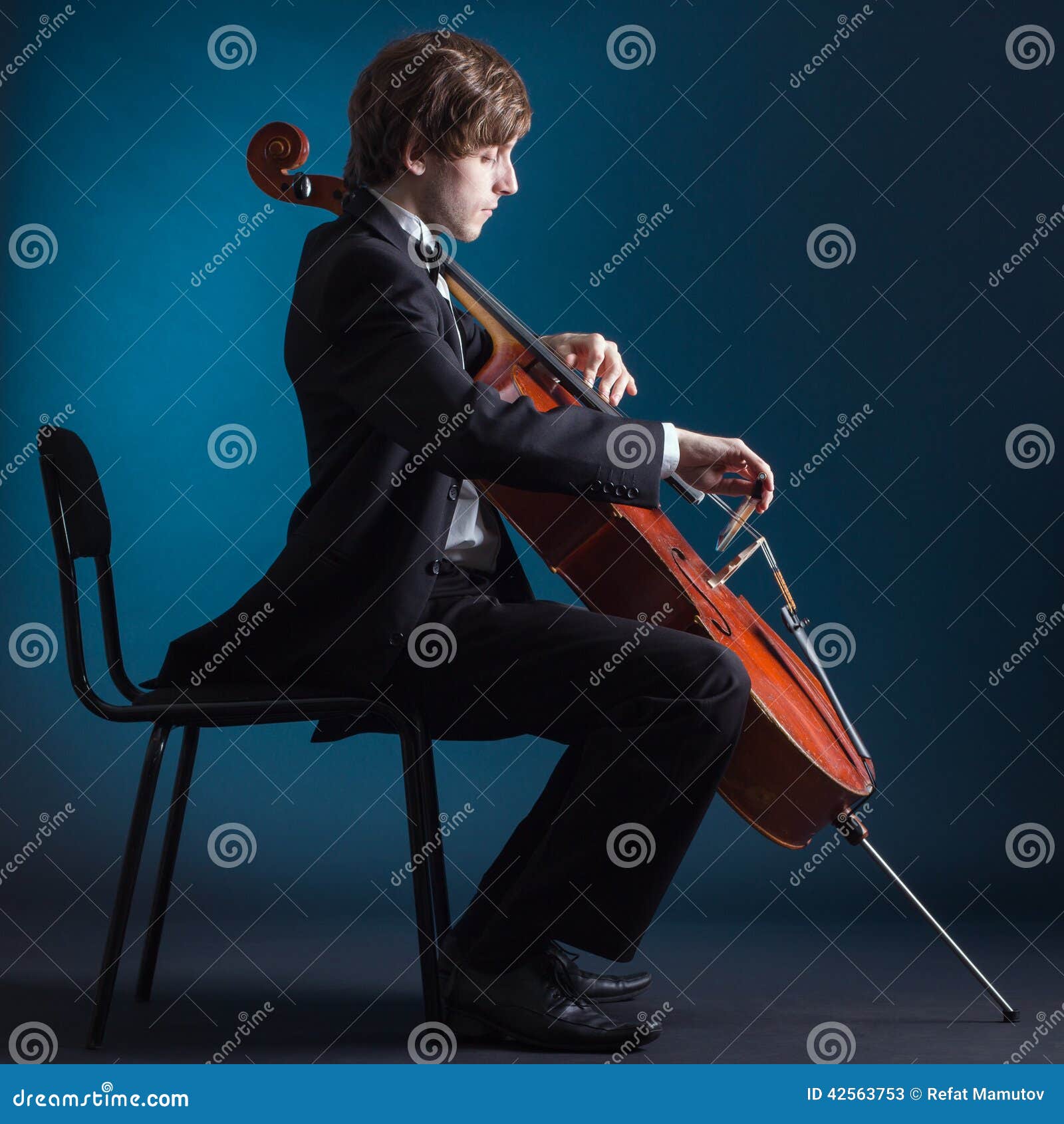Cellist playing on cello stock image. Image of concept - 42563753