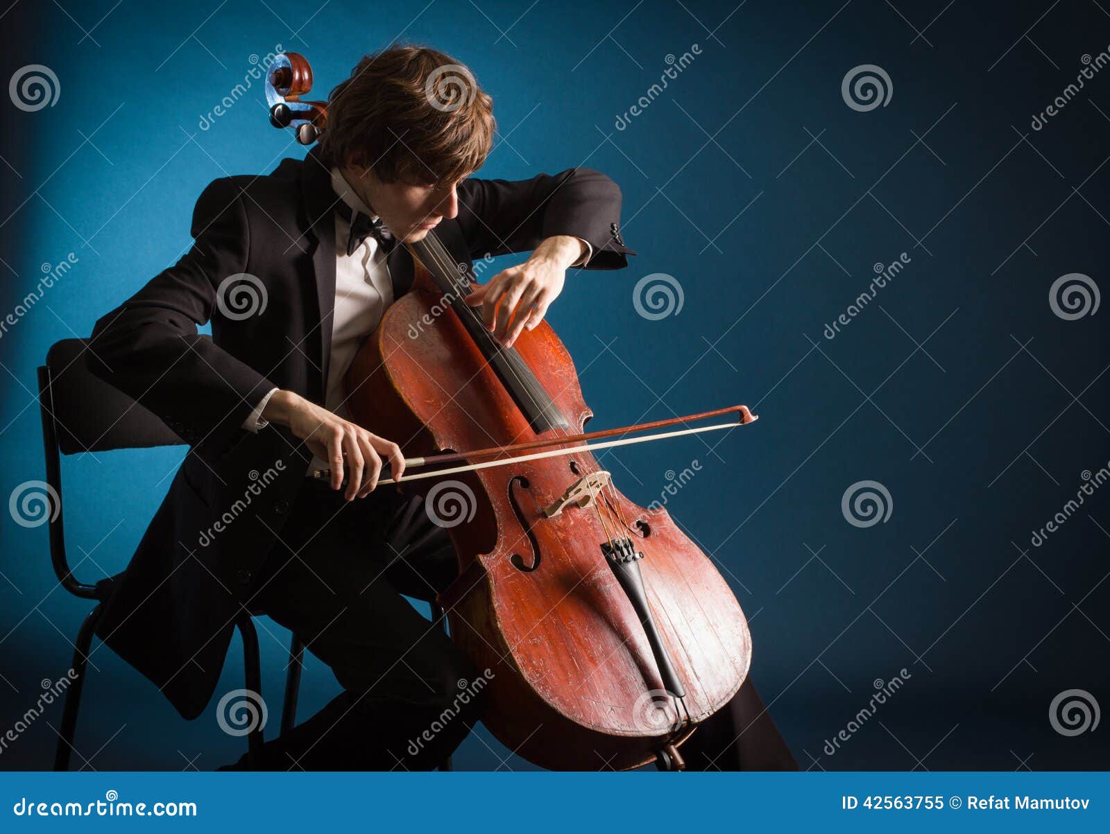 Cellist playing on cello stock image. Image of portrait - 42563755