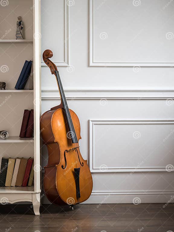 Cello in Classical Interior with Bookshelf Stock Image - Image of ...