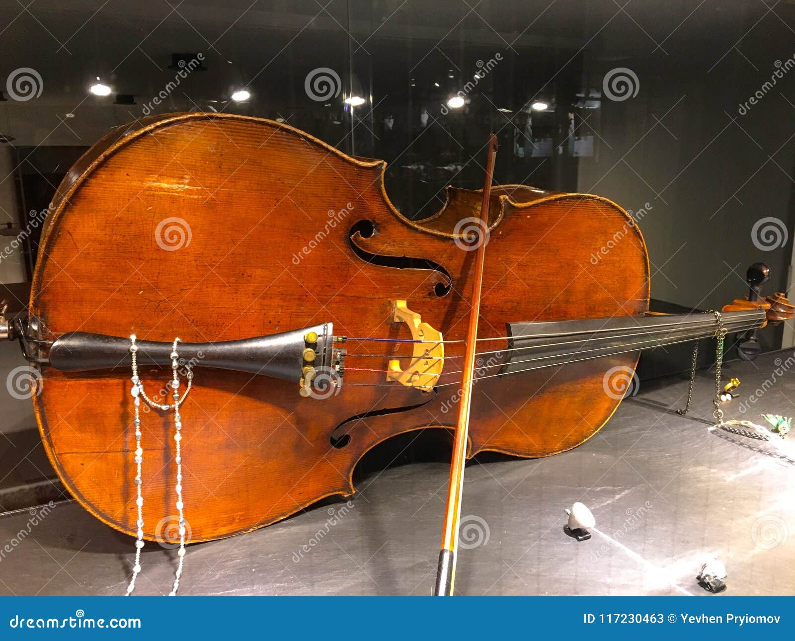 The cello lies on its side stock image. Image of musician - 117230463