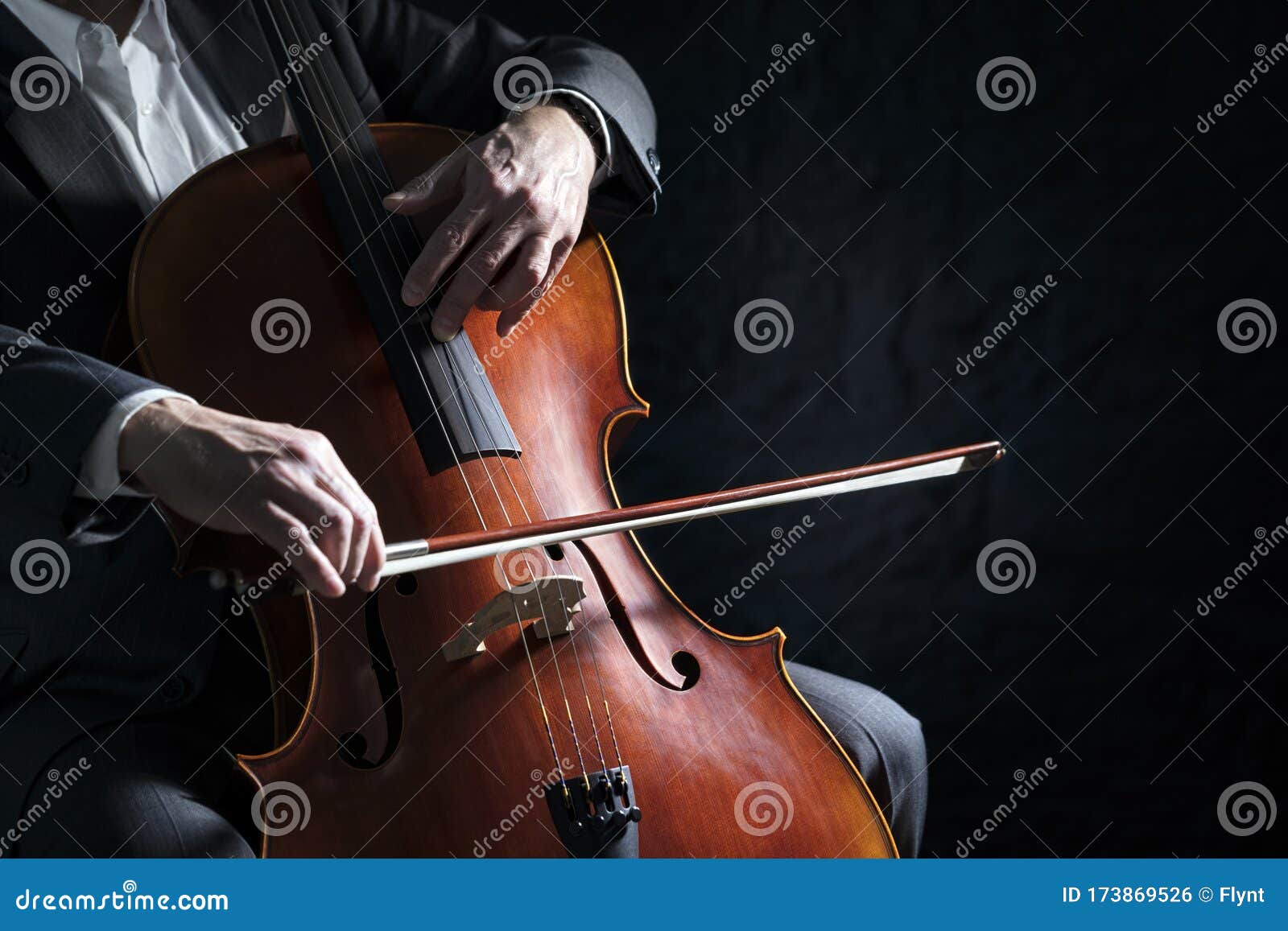 Cello Player or Cellist Performing in an Orchestra Background Stock ...