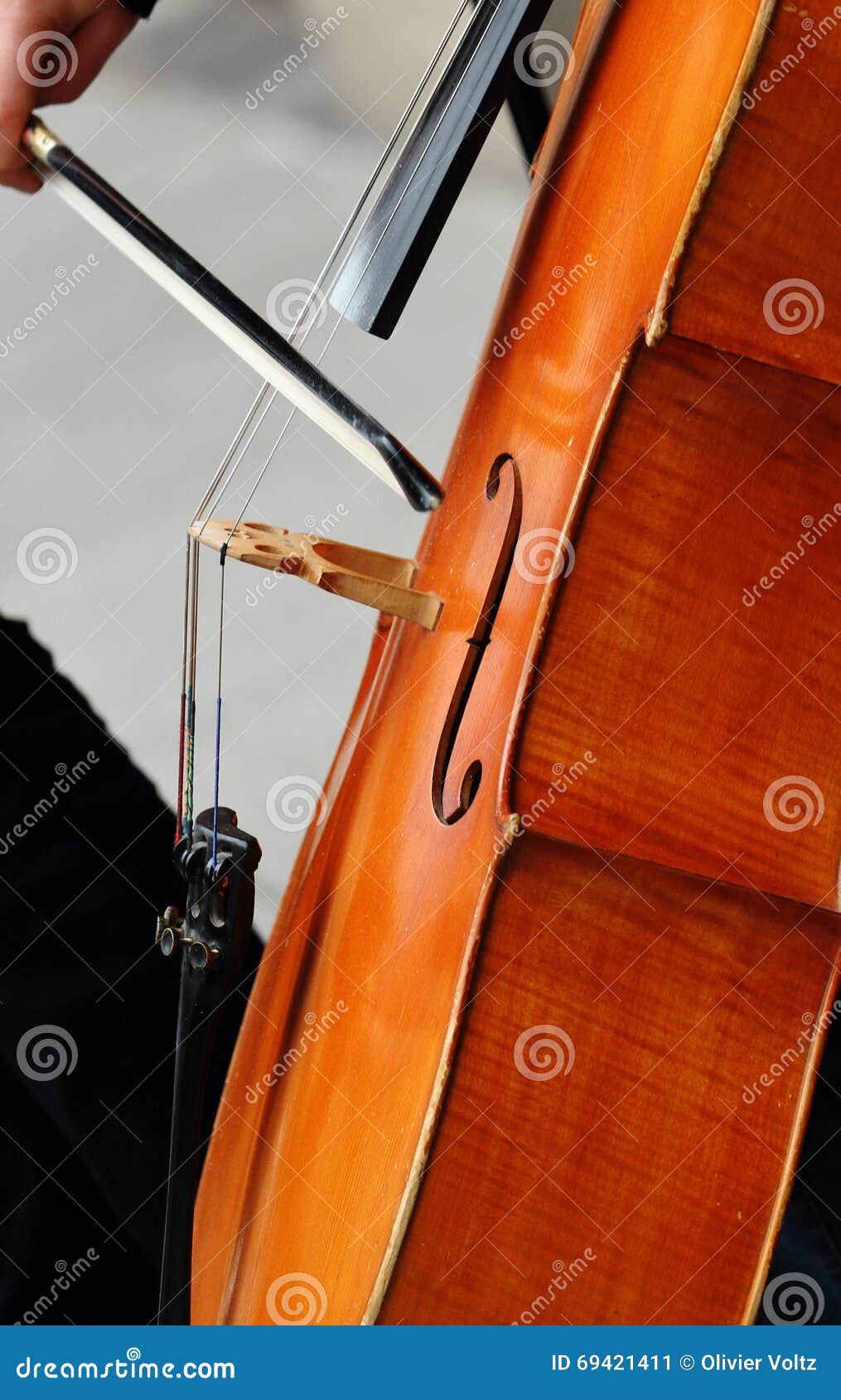 Cello player stock image. Image of closeup, background - 69421411