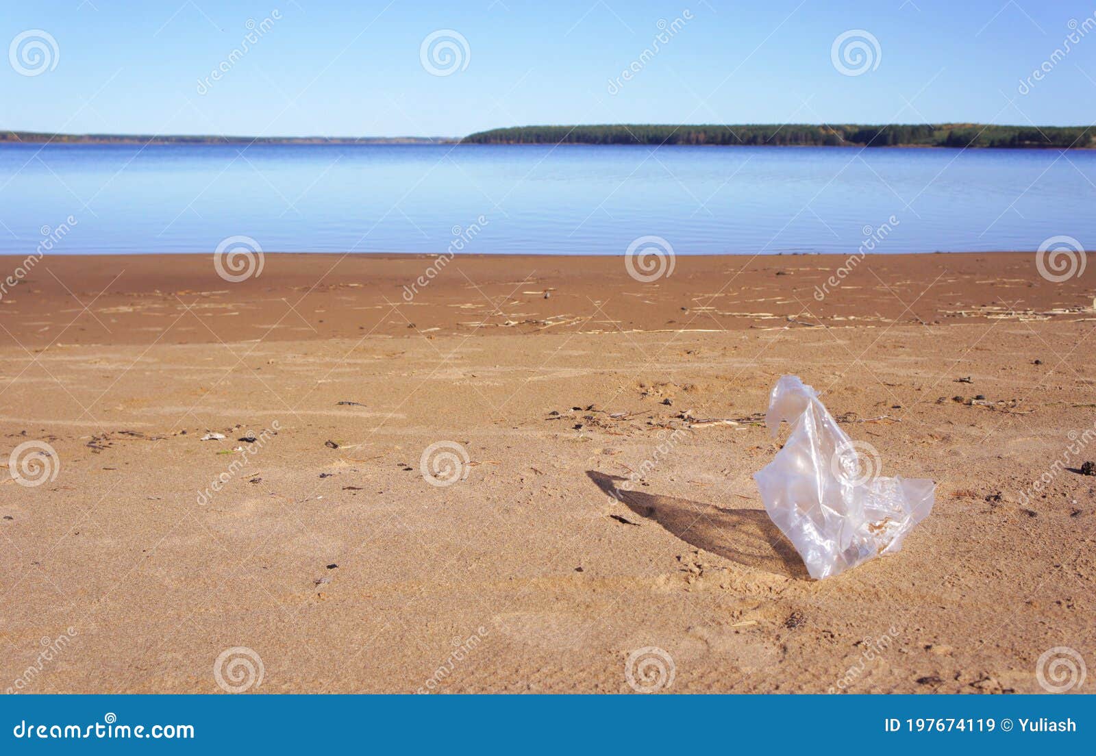 Cellophane Package on the Beach. the Problem of Environmental Pollution ...