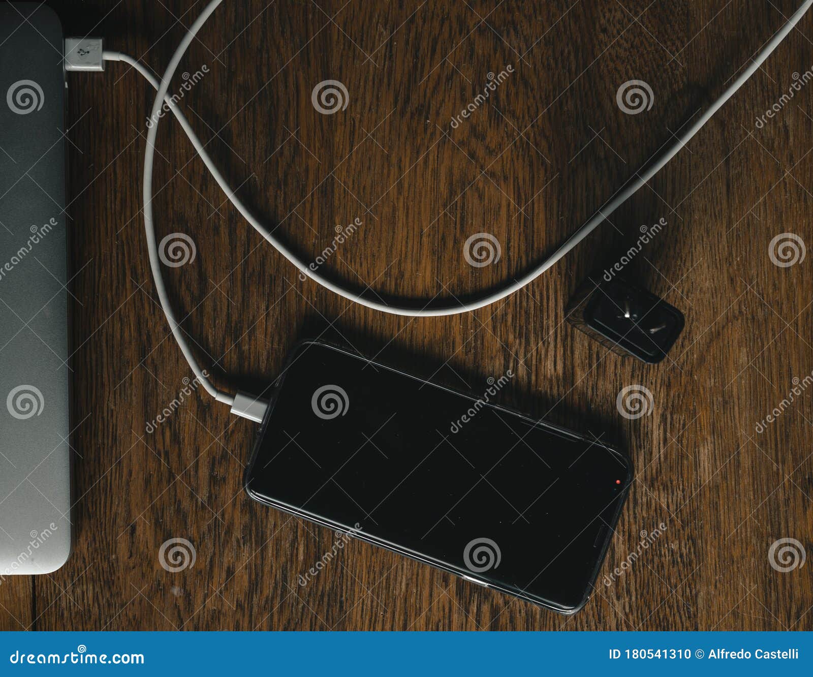 Cellphone Connected To Computer Stock Photo - Image of computer, brown ...