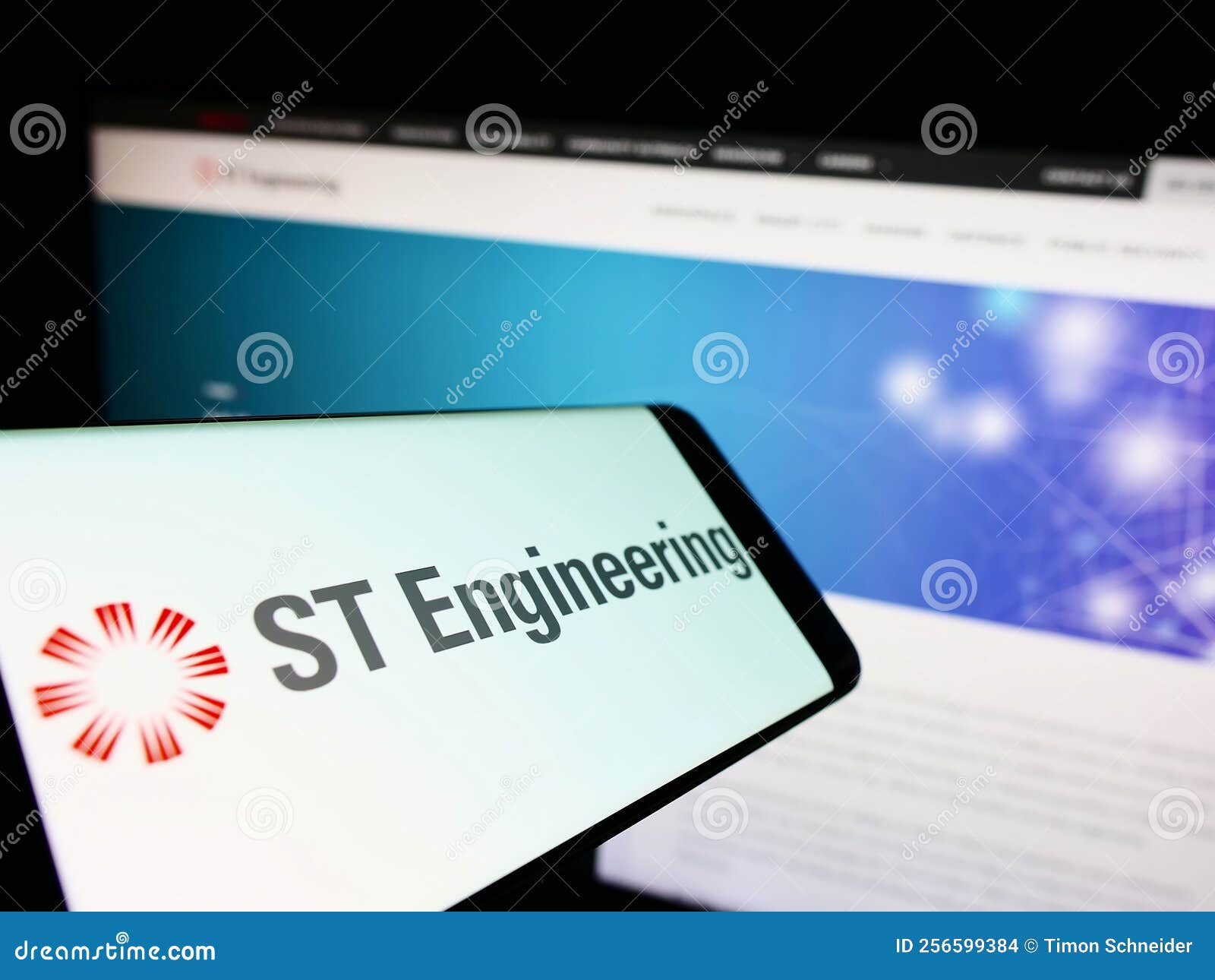 Cellphone with Logo of Singapore Technologies Engineering Ltd. (ST) on ...