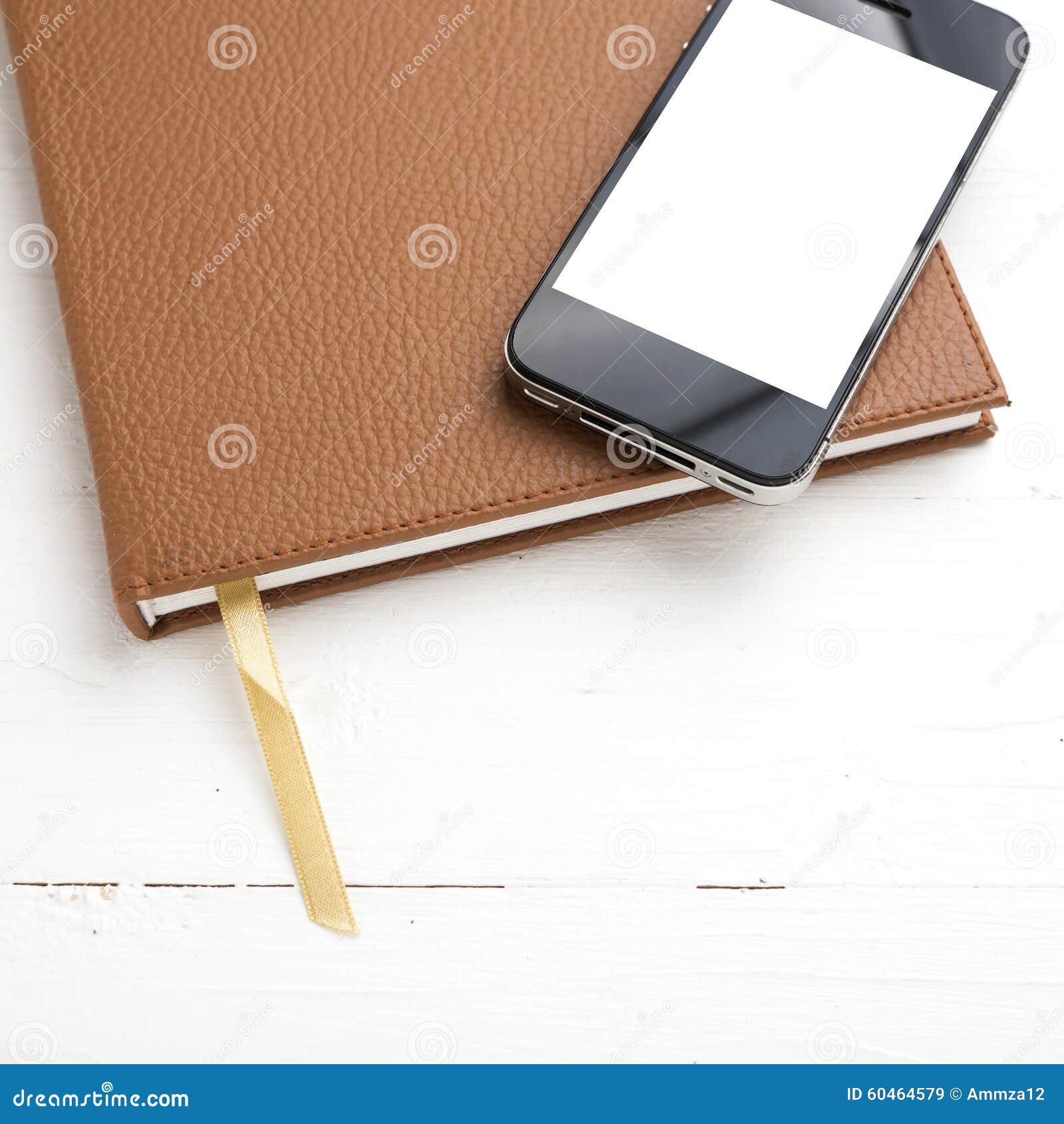 Cellphone on notebook stock image. Image of touch, smartphone - 60464579
