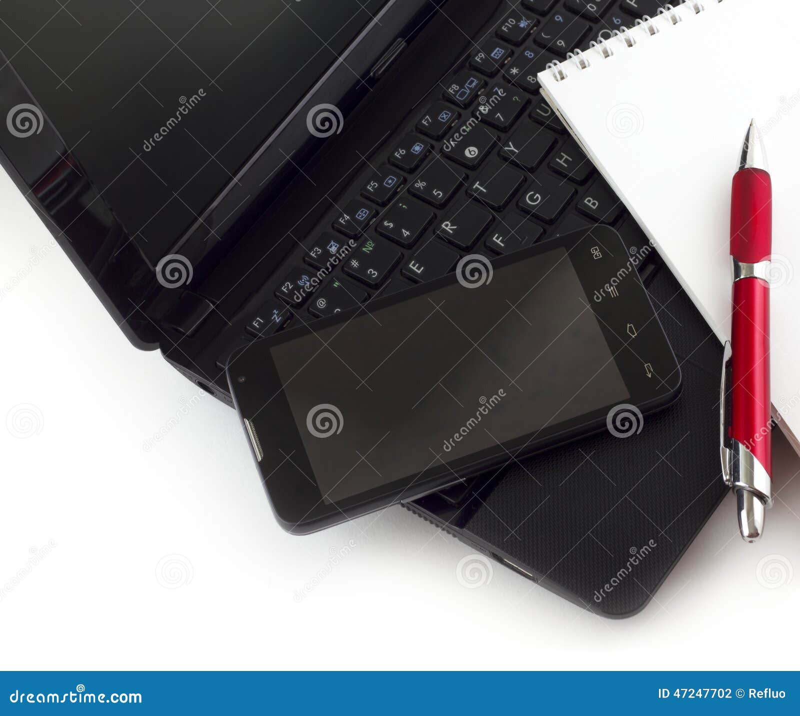 Cellphone and Notepad on Laptop Stock Photo - Image of personal, gadget ...