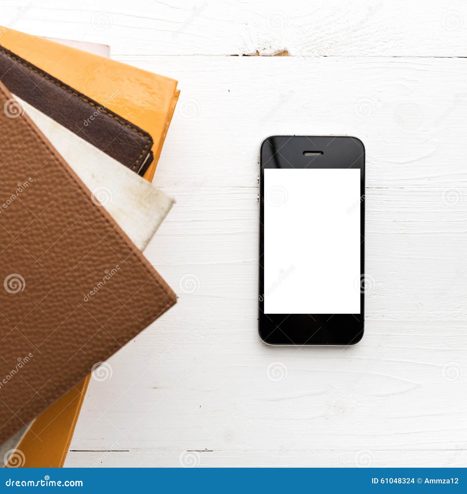 Cellphone with Stack of Book Stock Photo - Image of light, antique ...