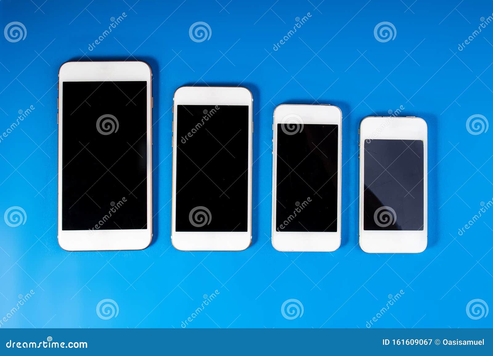 Cellphones on a Blue Background Stock Image - Image of lifestyle ...