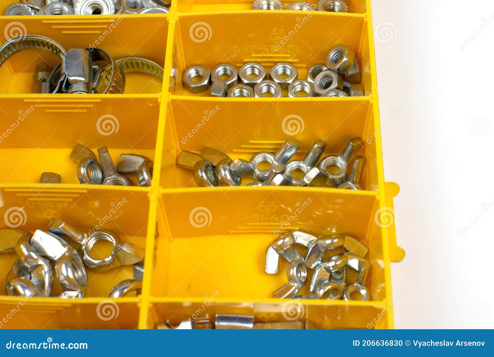 Different Kinds of Nuts in a Yellow Toolbox Stock Photo - Image of ...