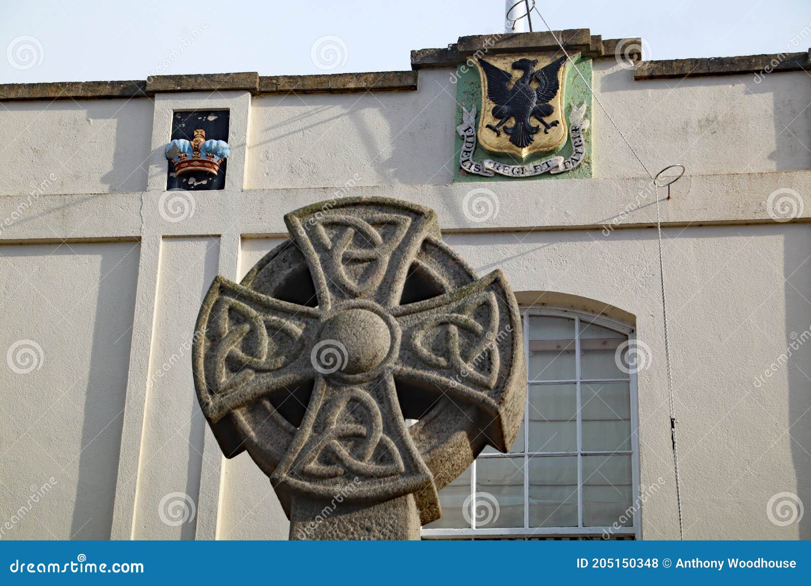 A Celtic Cross in Front of Bradninch Guildhall in Devon Stock Photo ...
