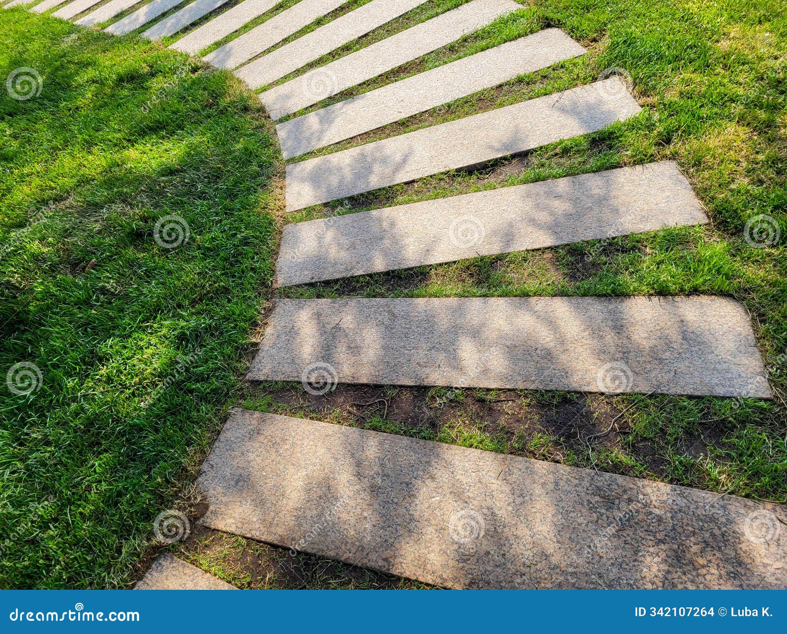 A Cement Block Path on a Green Lawn in a City Park. Stock Photo - Image ...