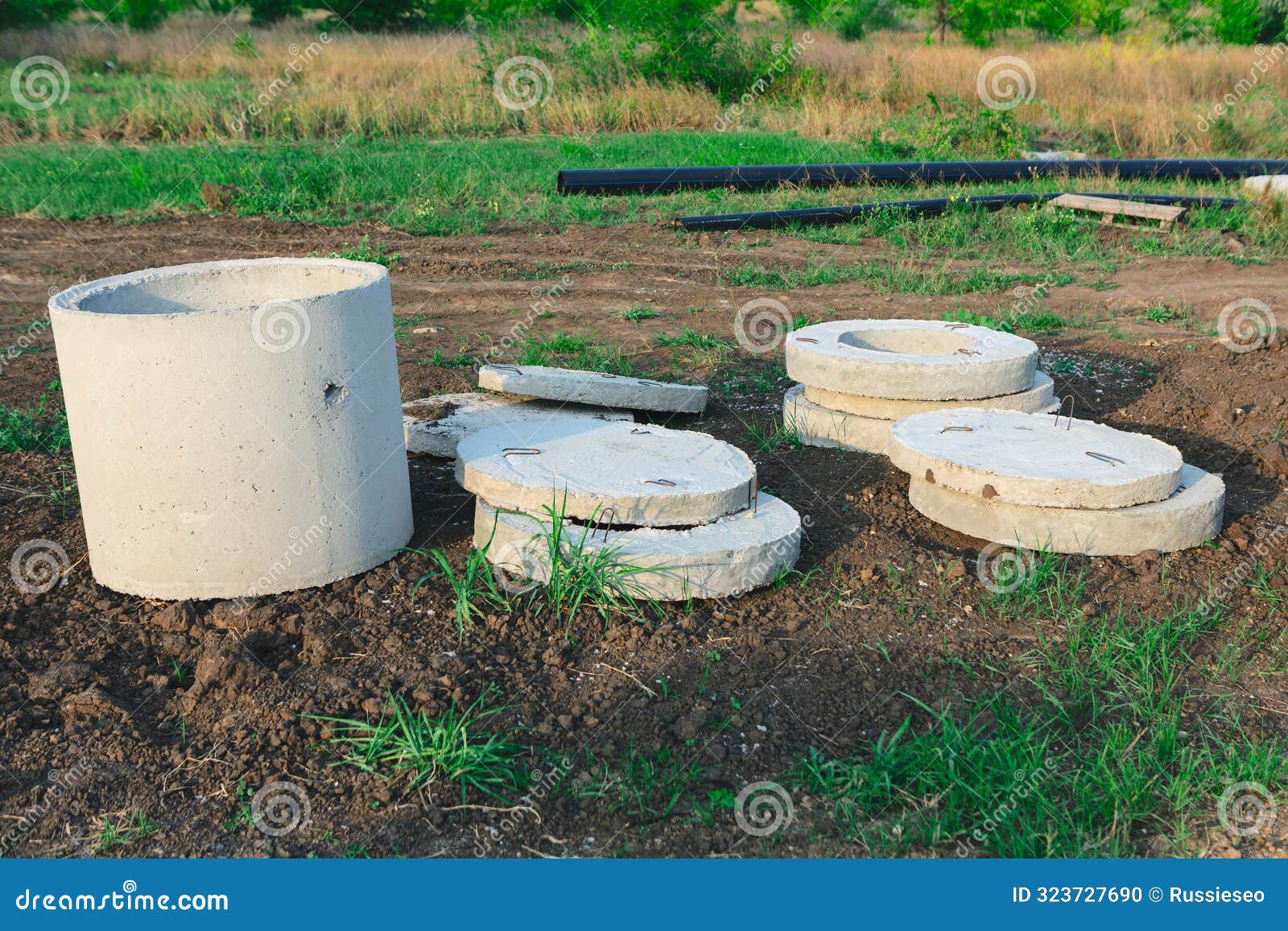 Cement Blocks and a Cement Pipe are on the Ground Stock Photo - Image ...