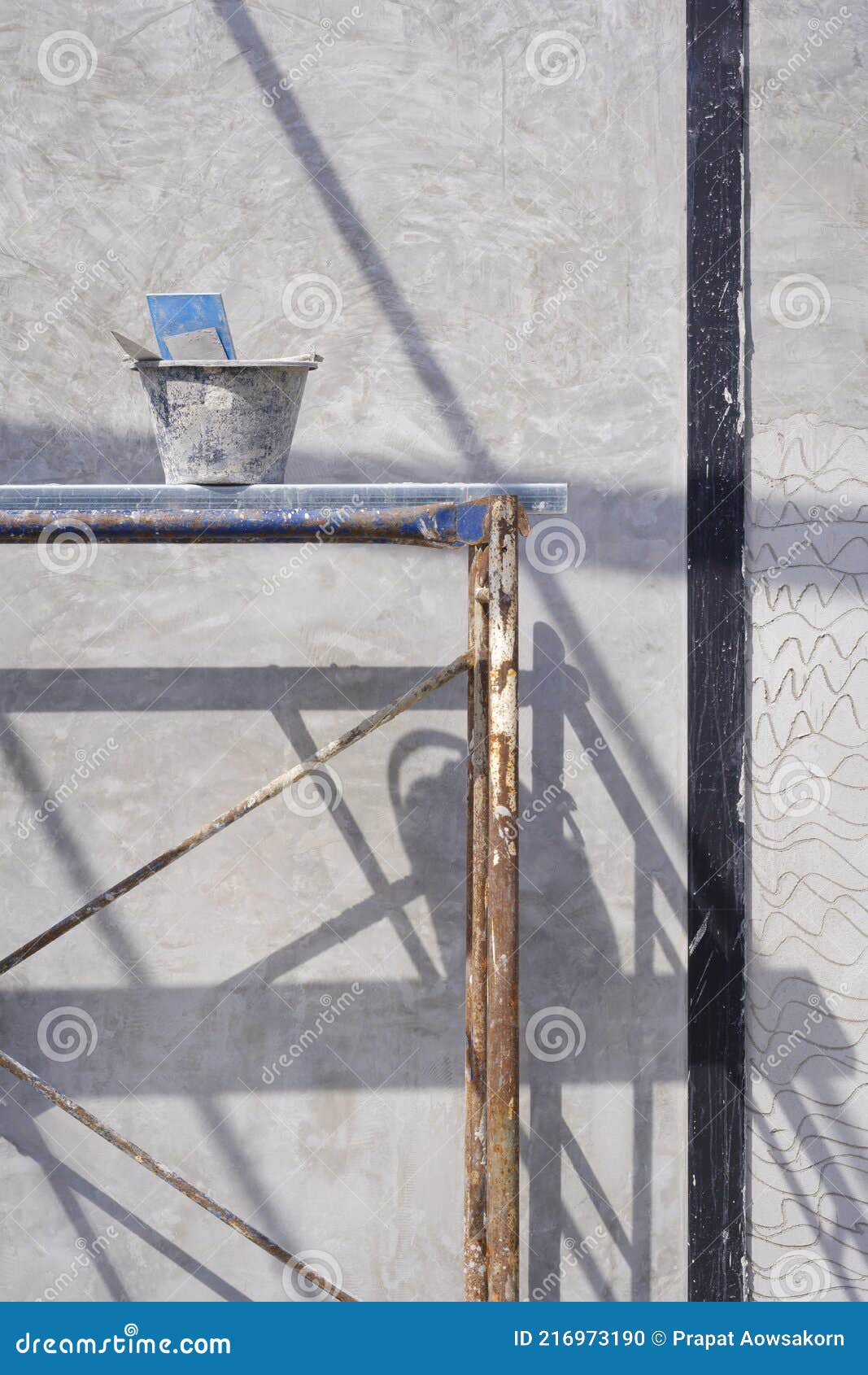 Cement Bucket with Plastering Tools on Scaffolding with Sunlight and ...