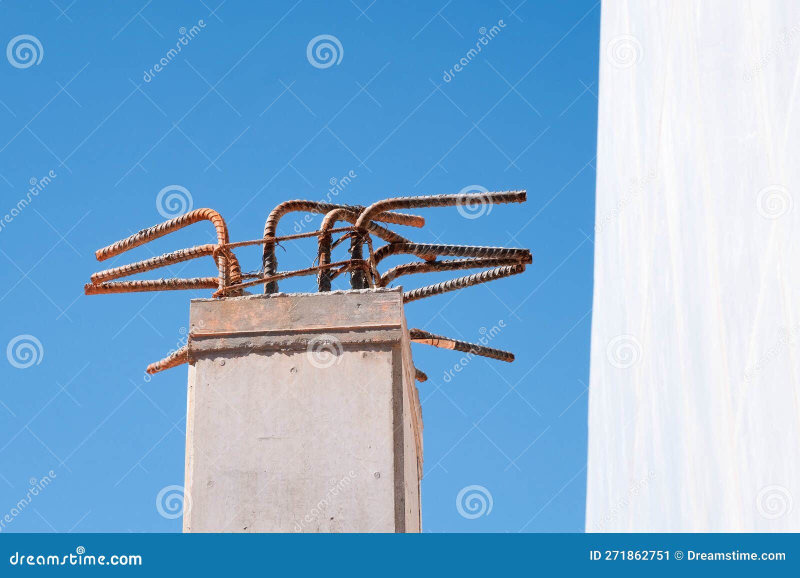 Cement Column Topped with Exposed Rebar at Right Angles and Perfect ...