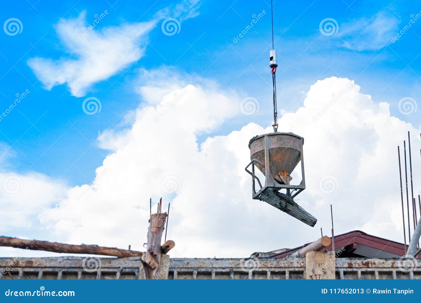 Cement or Concrete Bucket Hanging on Wire at Construction Site Stock ...
