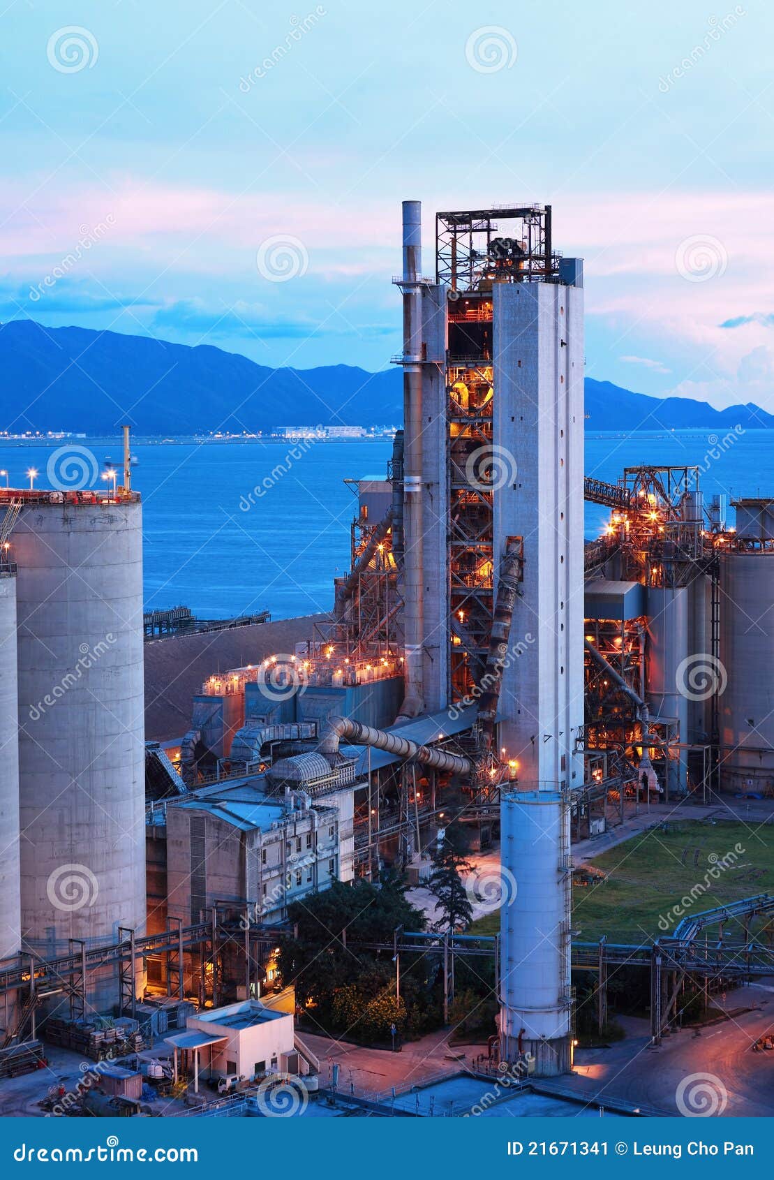 Cement factory at night stock image. Image of business - 21671341