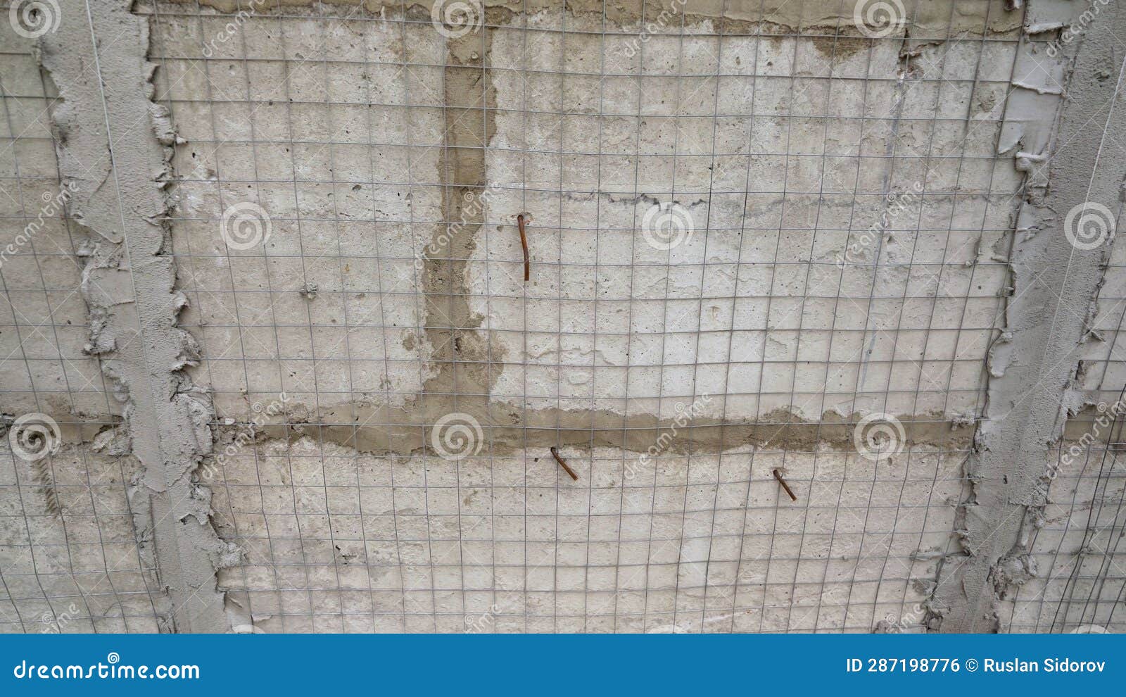Cement Fixing Mesh Attached To a Rough Cement Wall. Application of ...