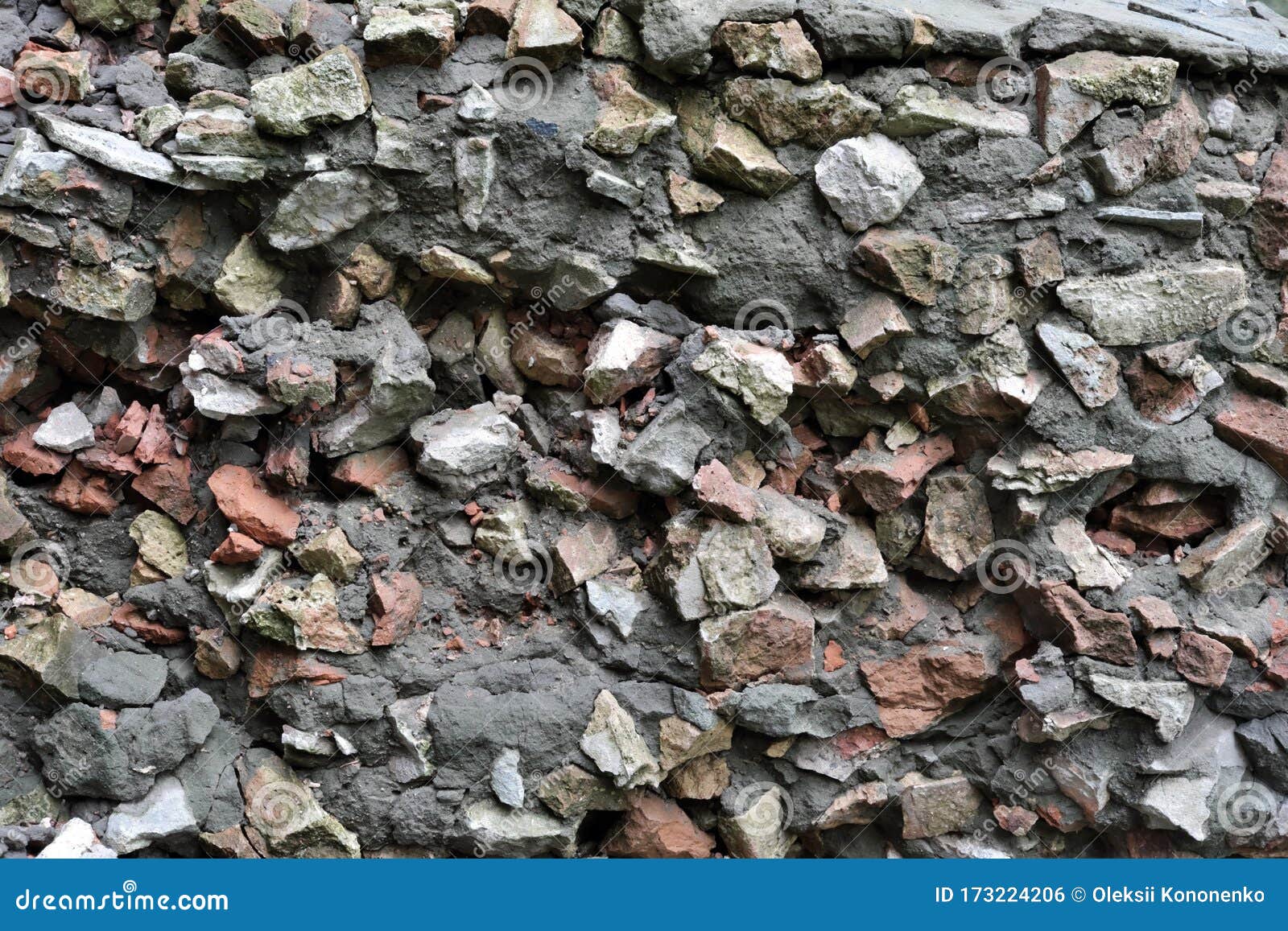 Cement Mix with Fragments of Broken Brick and Stones As a Background ...