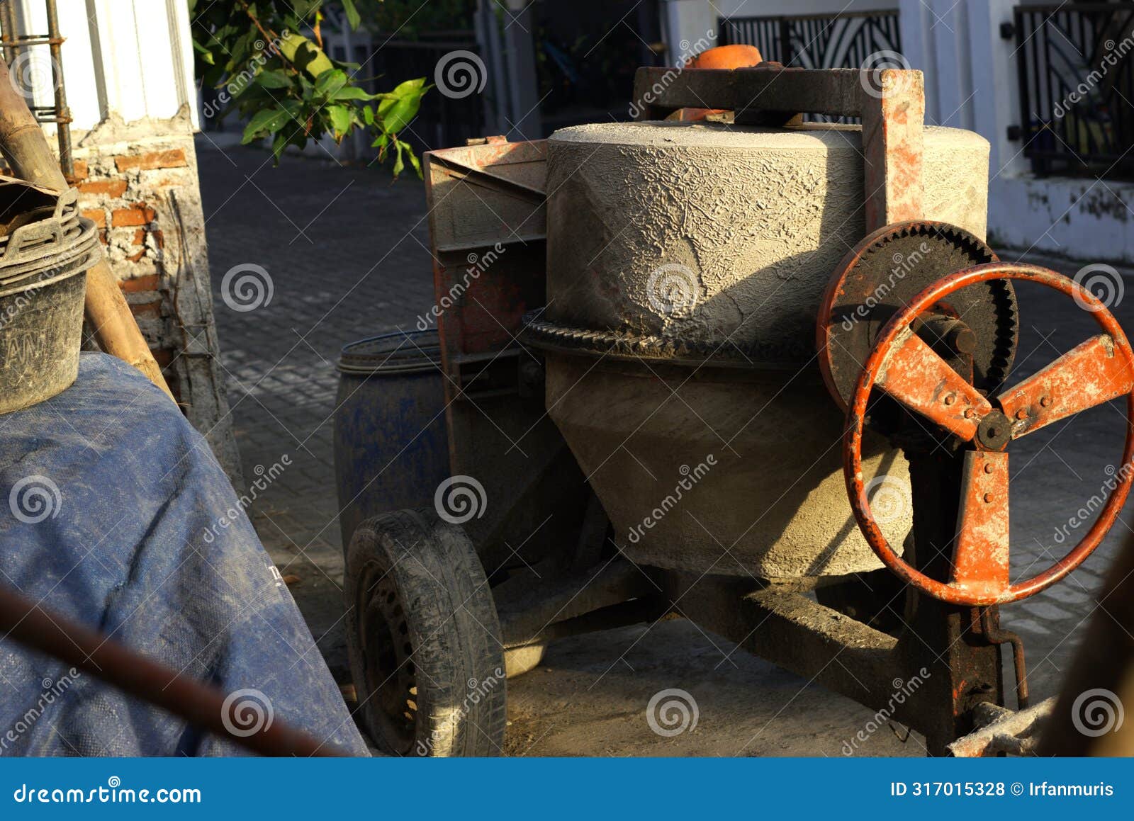 Cement Mixer in a Construction Site, Concrete Maker Machine Stock Photo ...