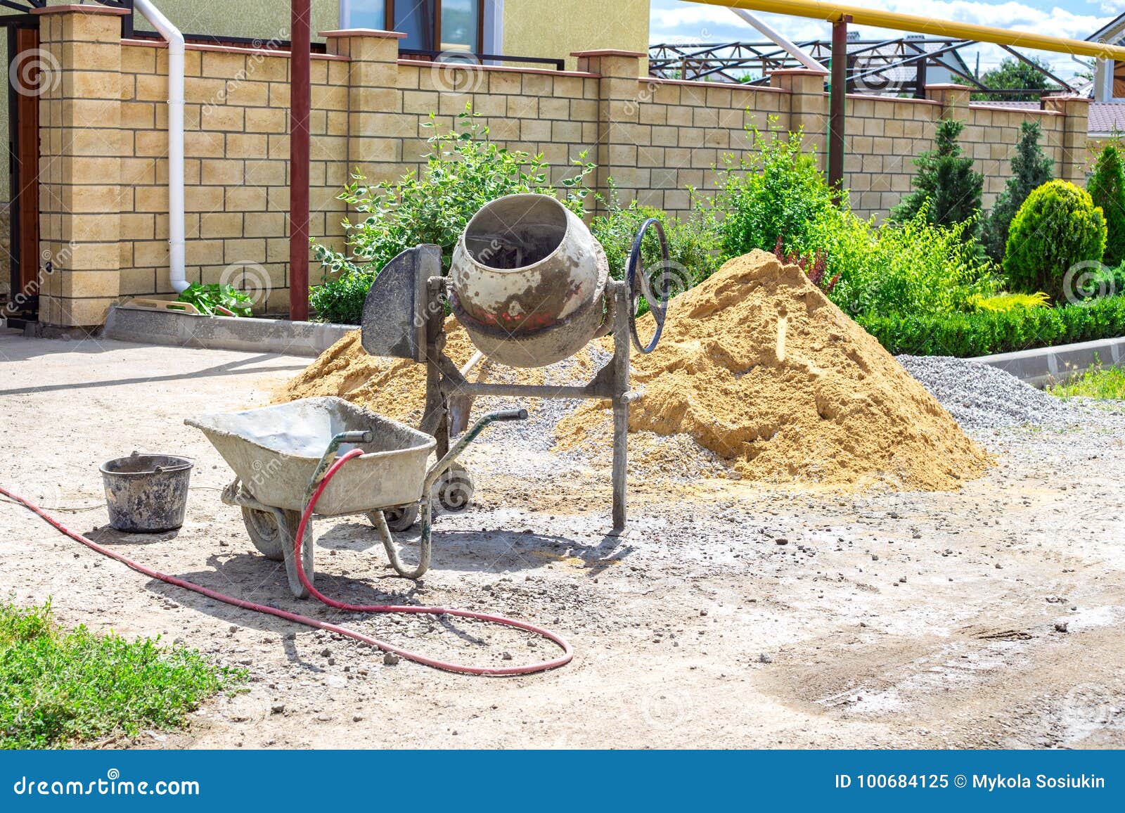 Cement Mixer Machine at Construction Site, Tools and Sand Stock Image ...