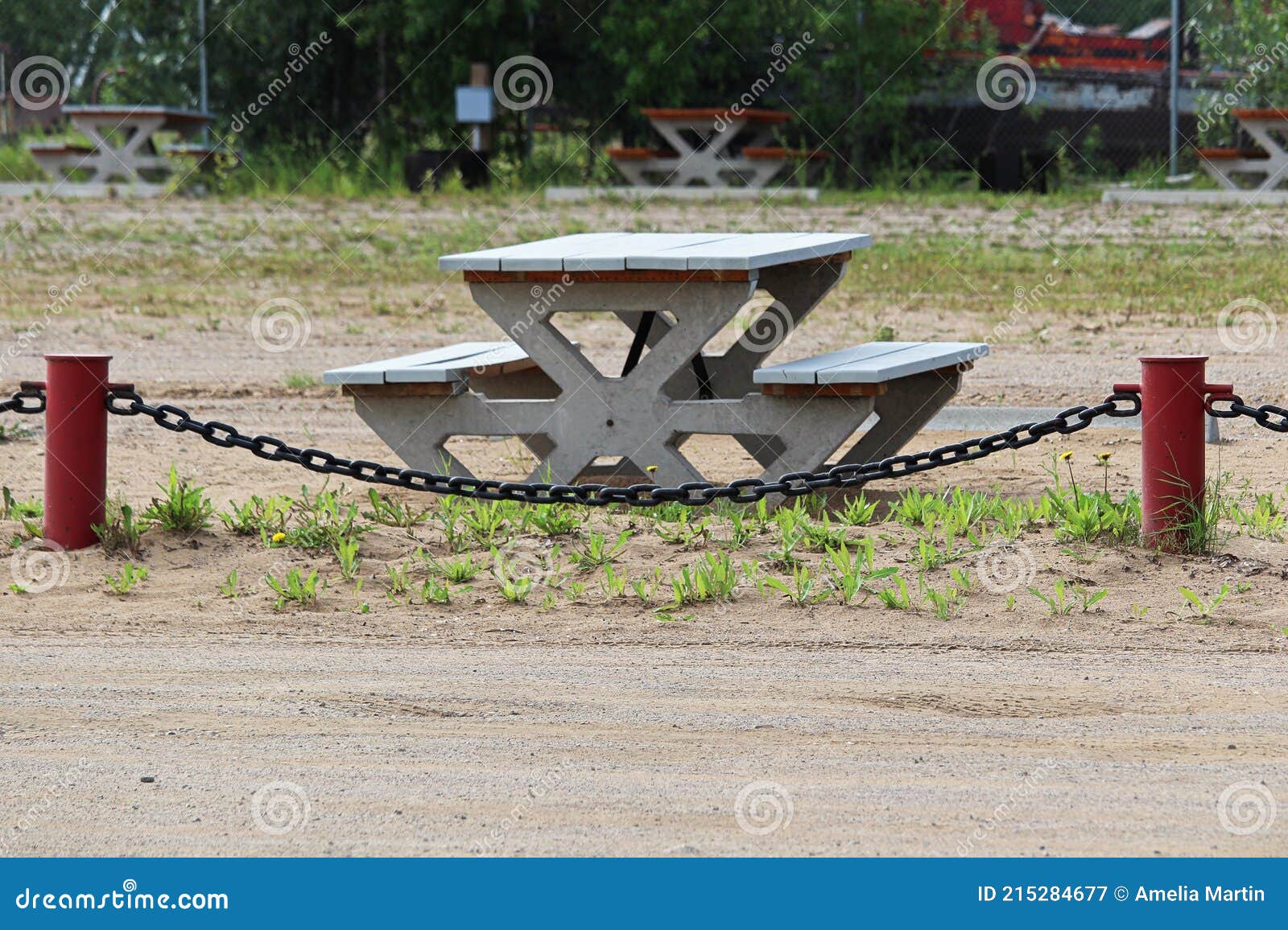 A Cement Picnic Table Behind a Chain Link Fence Stock Image - Image of ...
