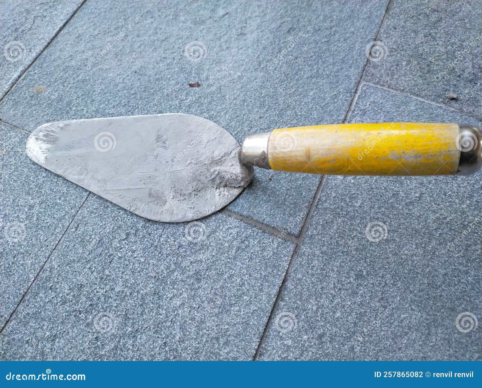 A Cement Spoon on the Stone Floor Stock Photo - Image of wing, flooring ...
