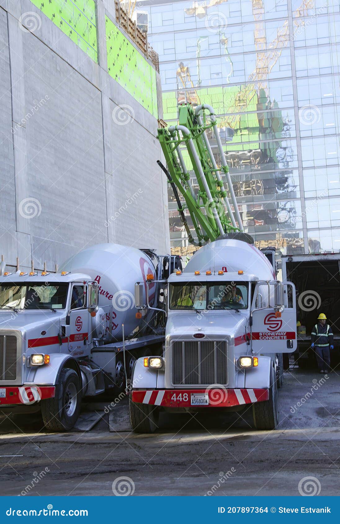 Cement Trucks Unloading at Construction Site Editorial Stock Image ...