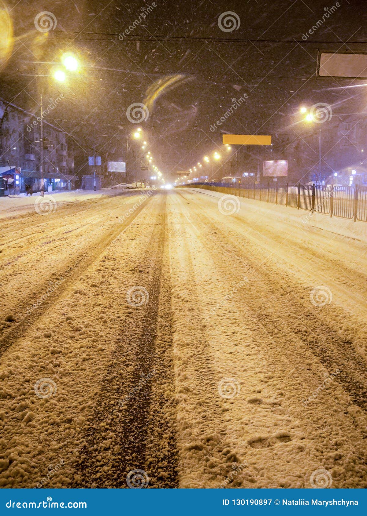 Center of the Snowy Road in the Night City with Snowfall. Stock Image ...
