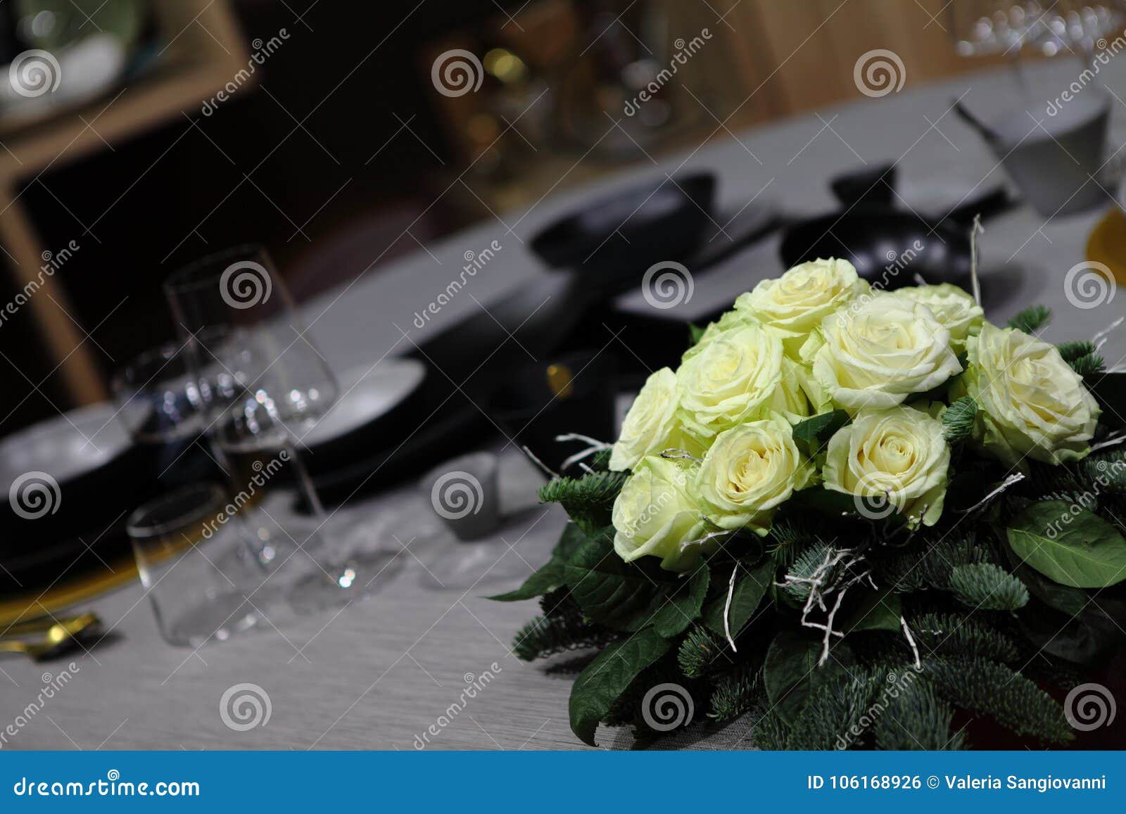 Centerpiece of Roses on the Table Stock Photo - Image of background ...