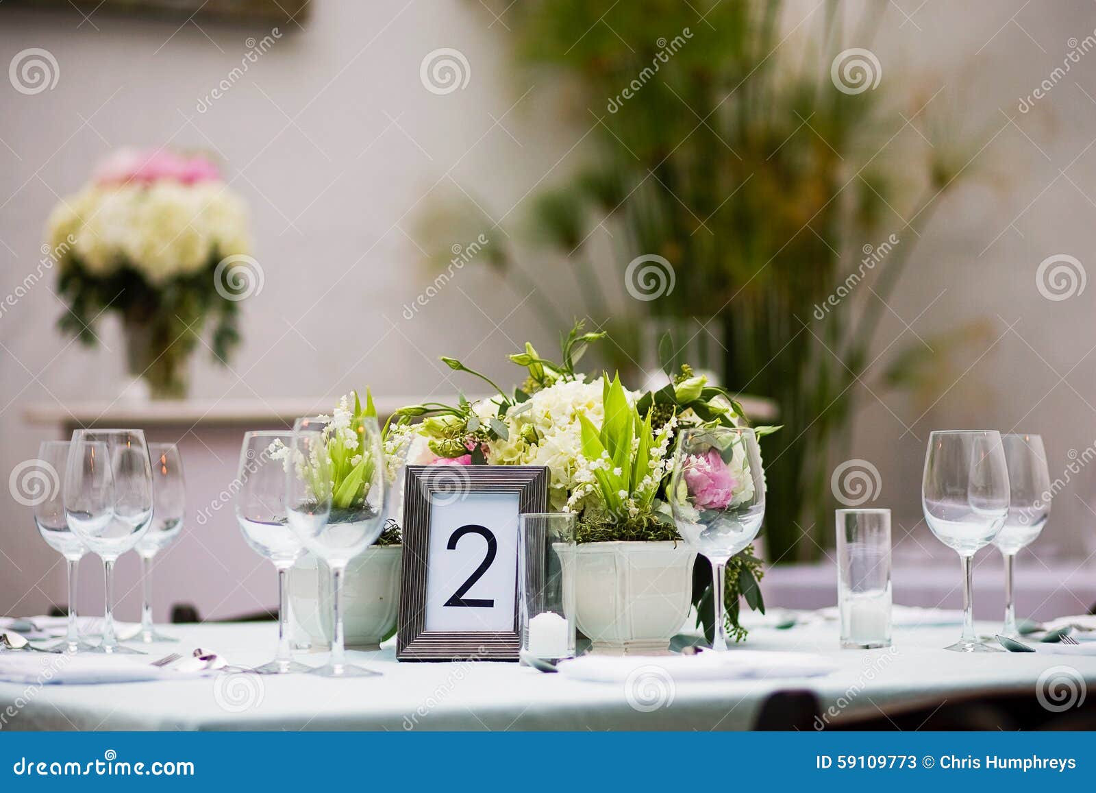 Centerpieces on a table stock image. Image of dining - 59109773