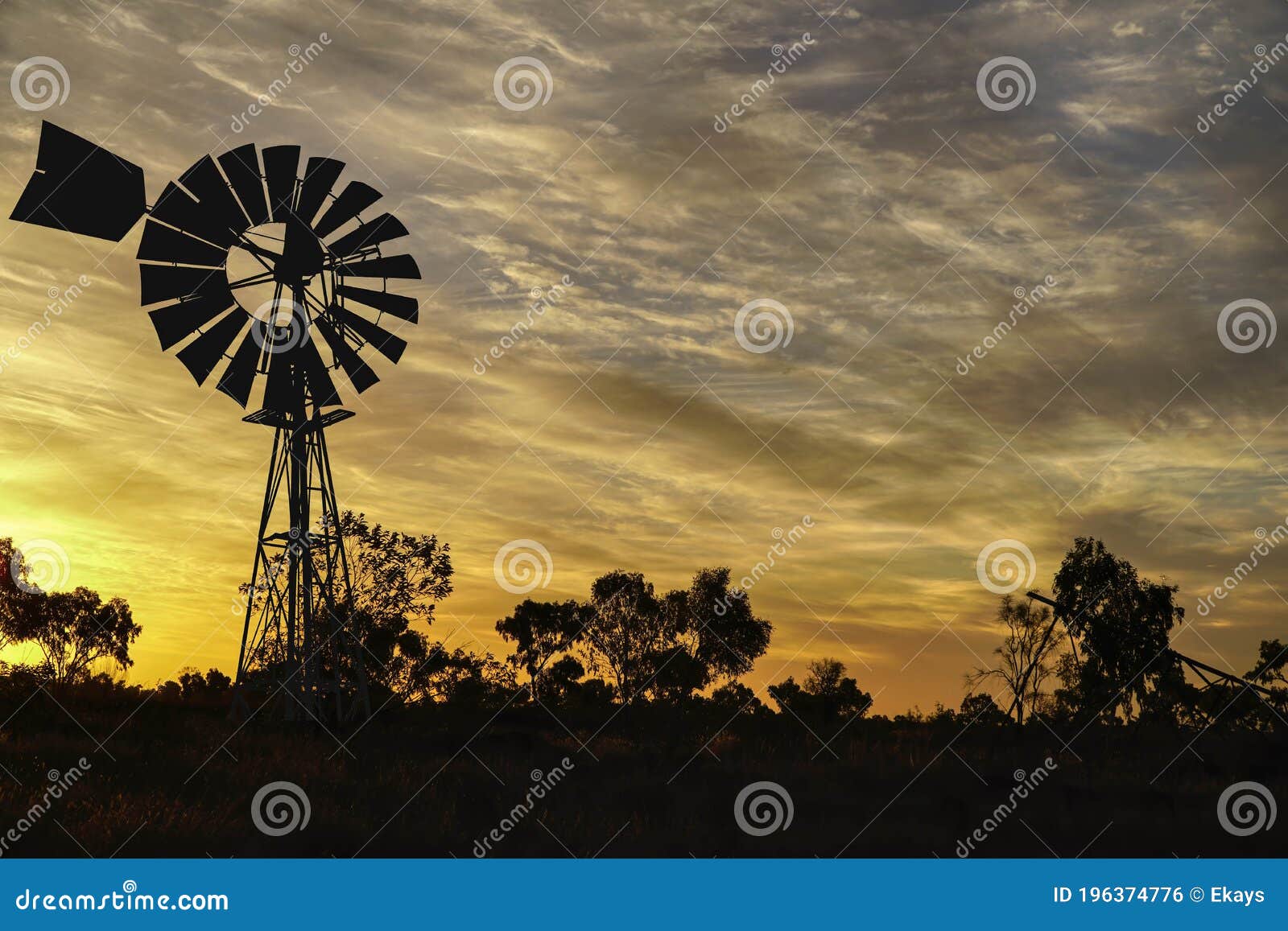 Central Australia Windmill at Sunset Stock Photo - Image of season ...