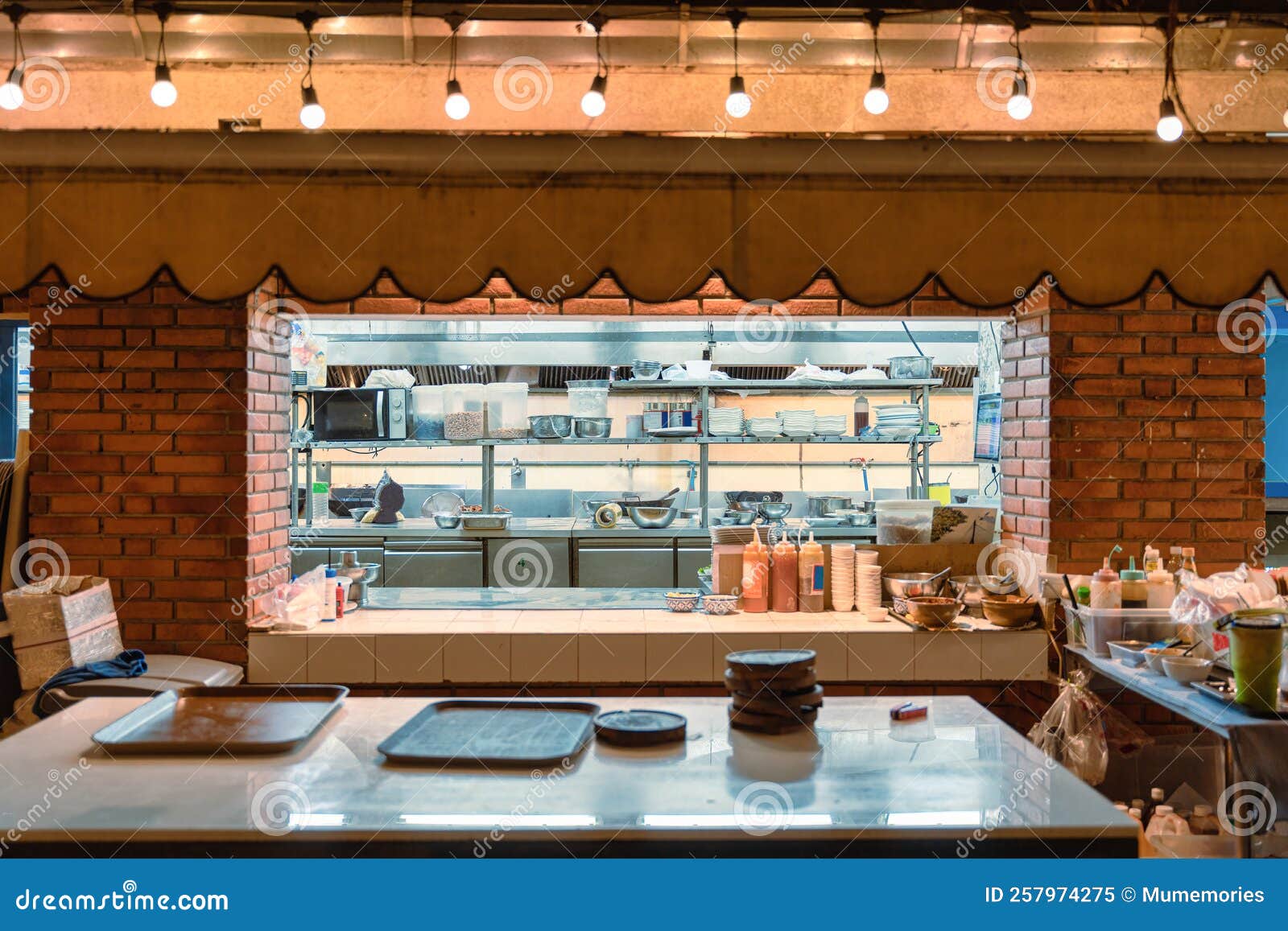 Central Kitchen with Stainless Shelf, Counter Bar, Kitchenware ...
