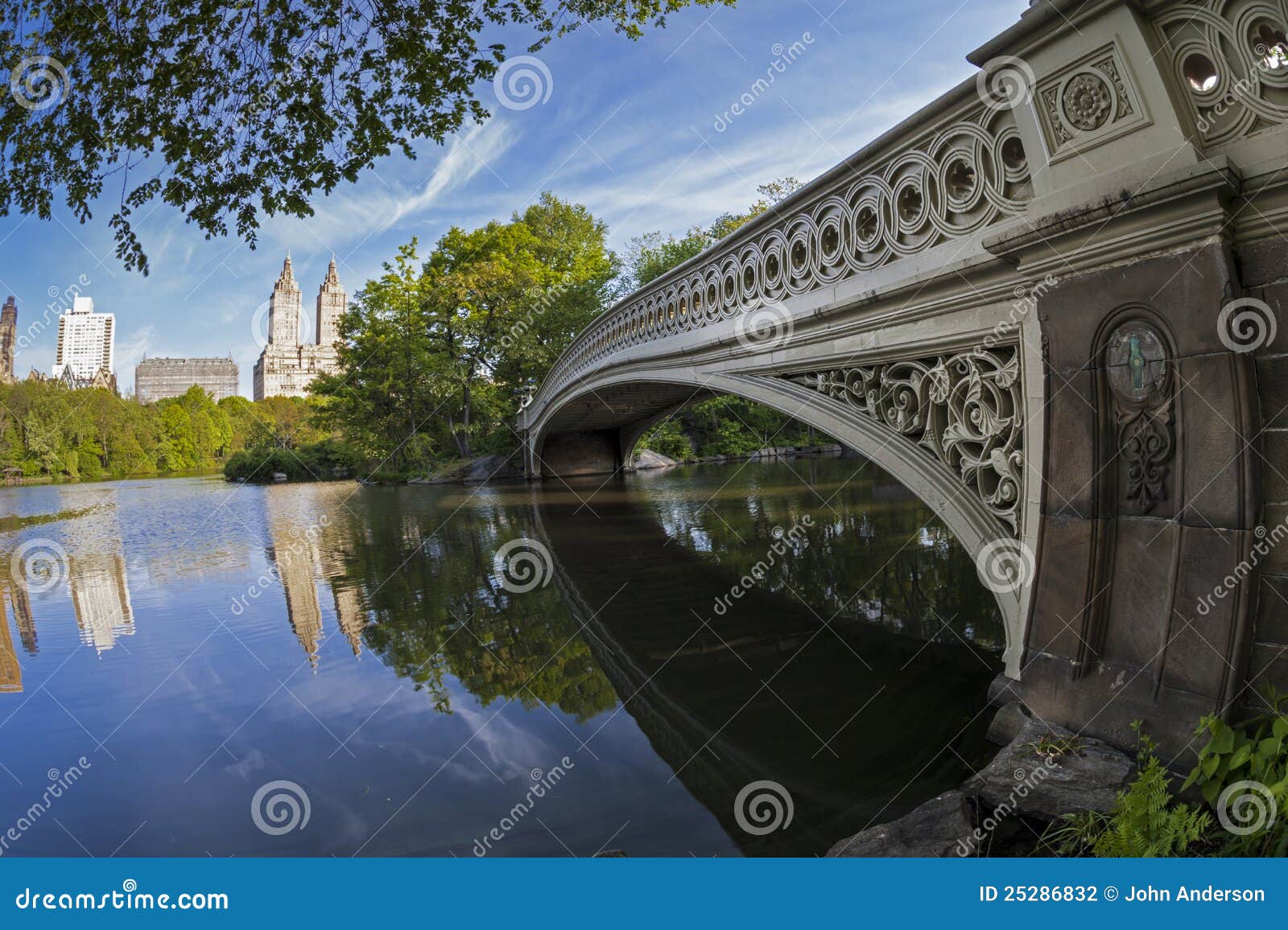 Central Park bow bridge stock photo. Image of buildings - 25286832